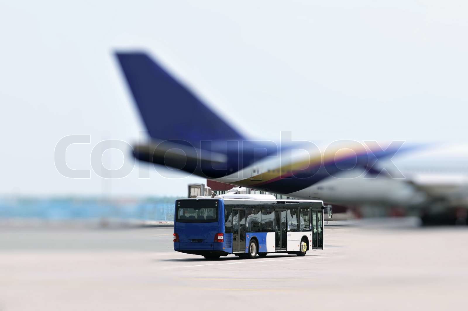Airport bus and plane | Stock image | Colourbox