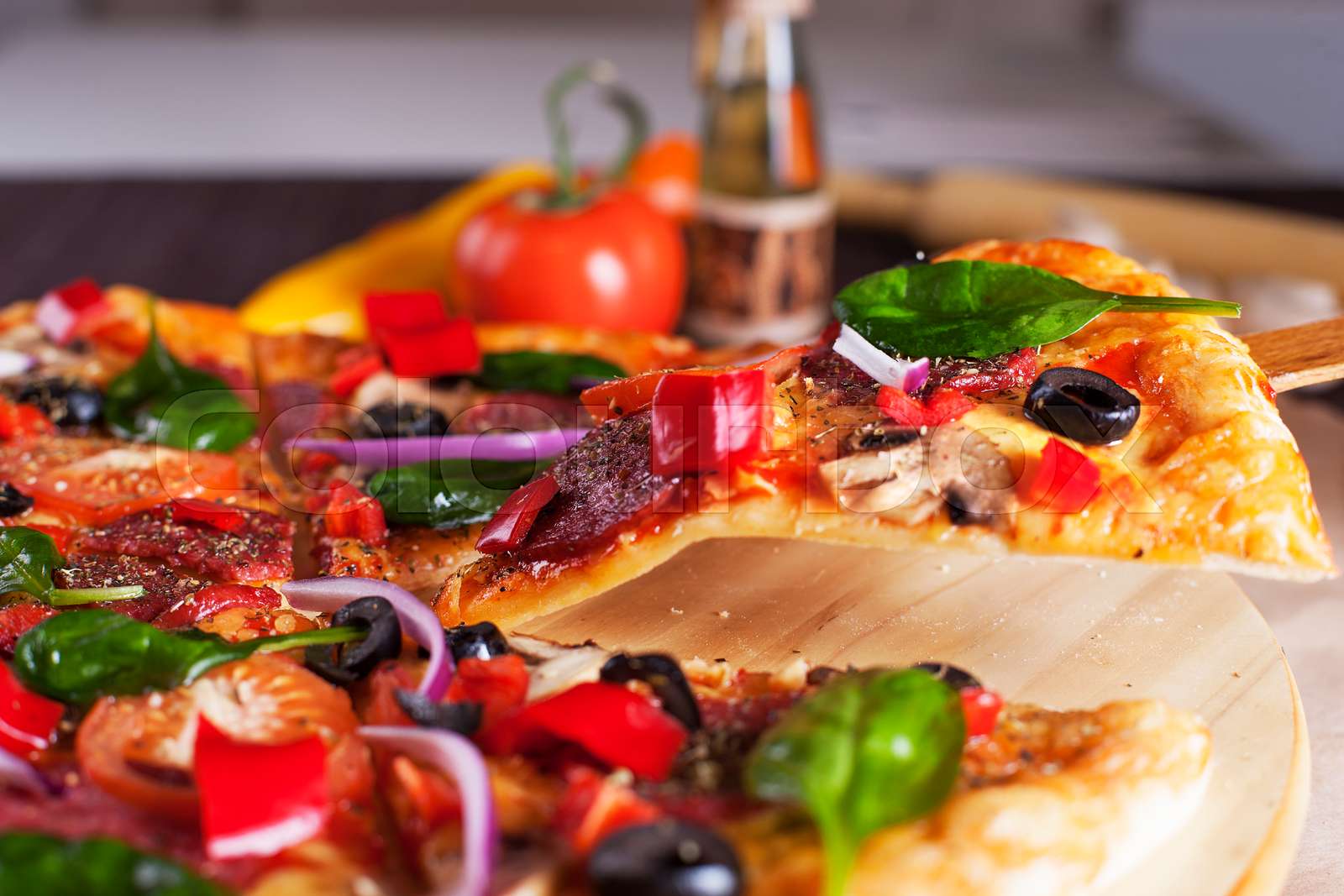 Pizza Slice lift | Stock image | Colourbox