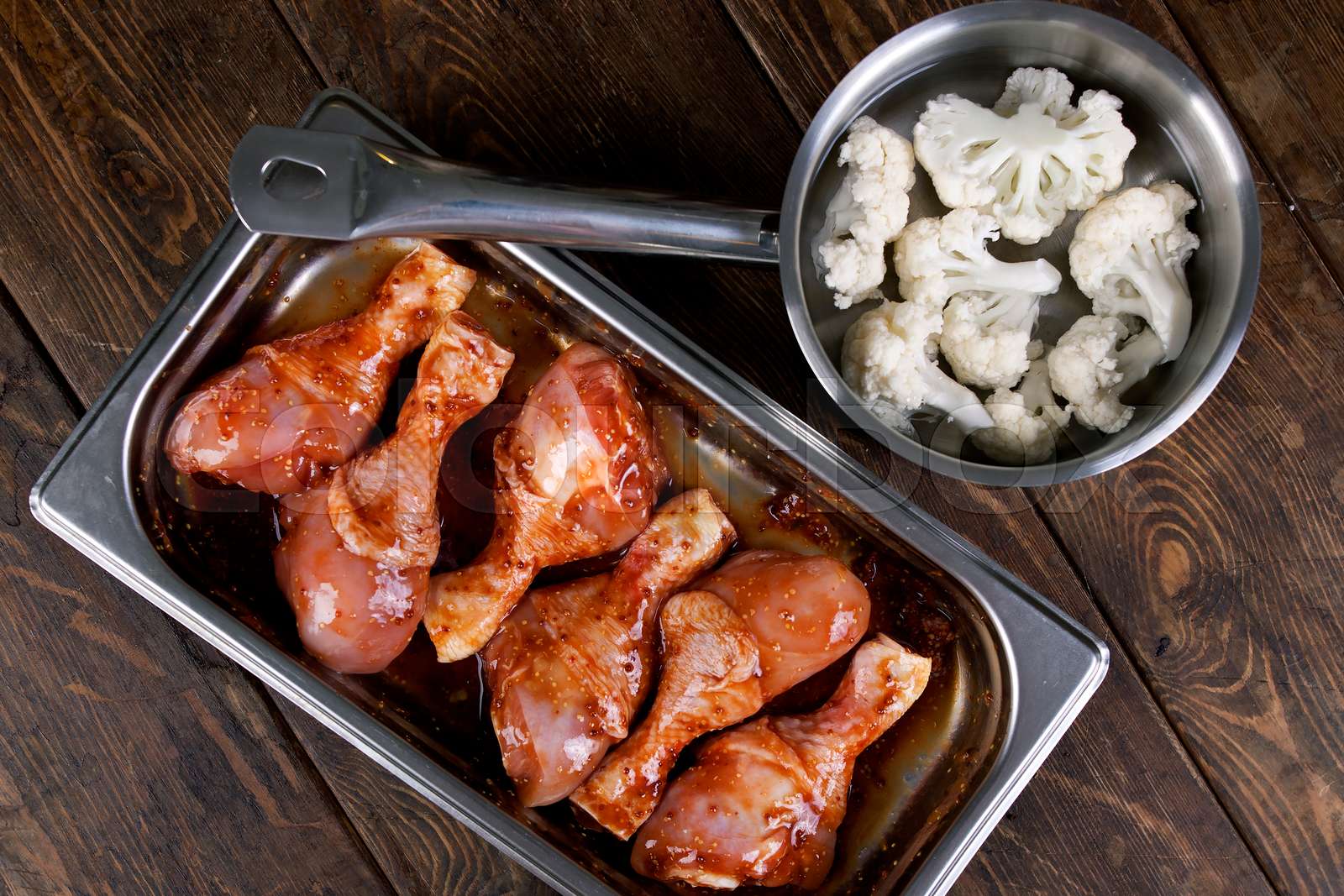 Cauliflower with chicken legs. Cooking. Recipe | Stock image | Colourbox