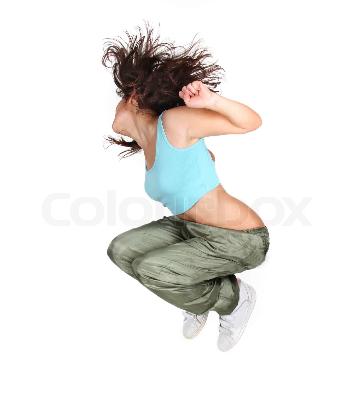 young attractive woman jumping isolated over white | Stock image ...