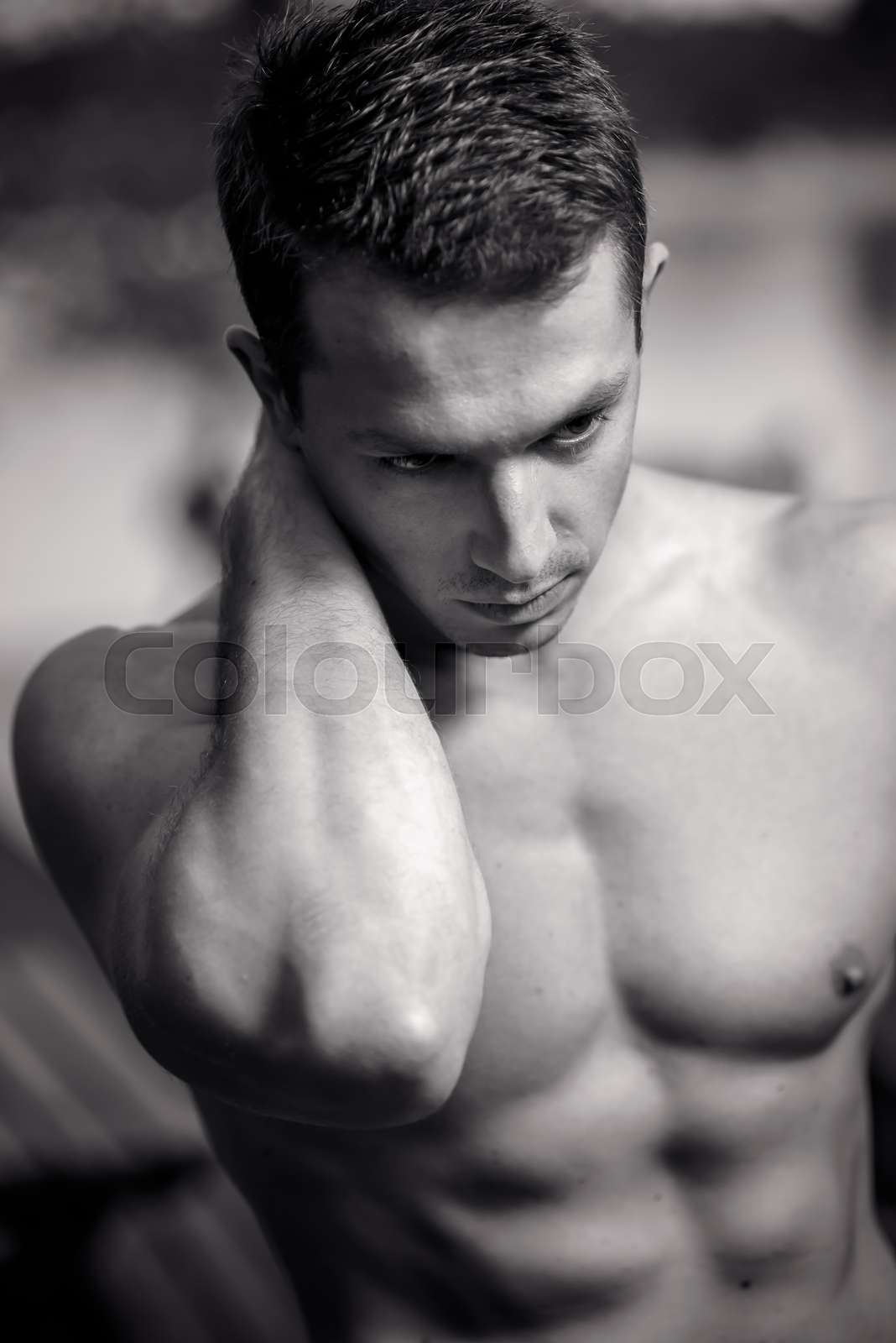 Sexy muscular man on the beach | Stock image | Colourbox