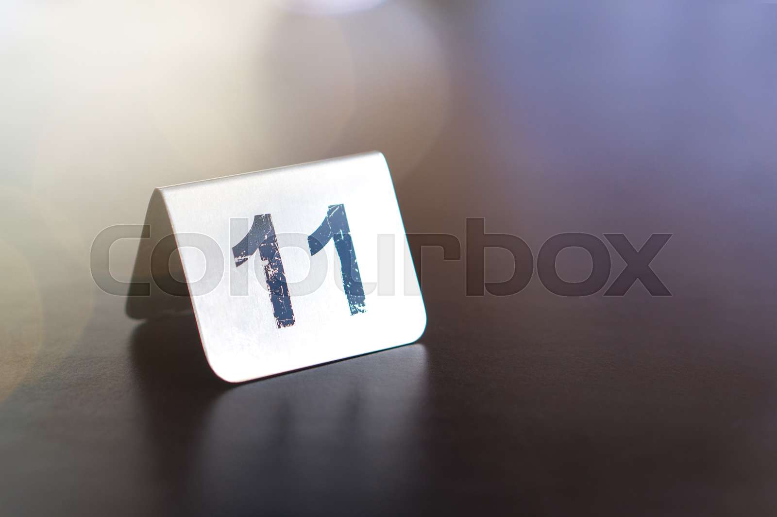 Number sign on restaurant table to show reservation. | Stock image ...
