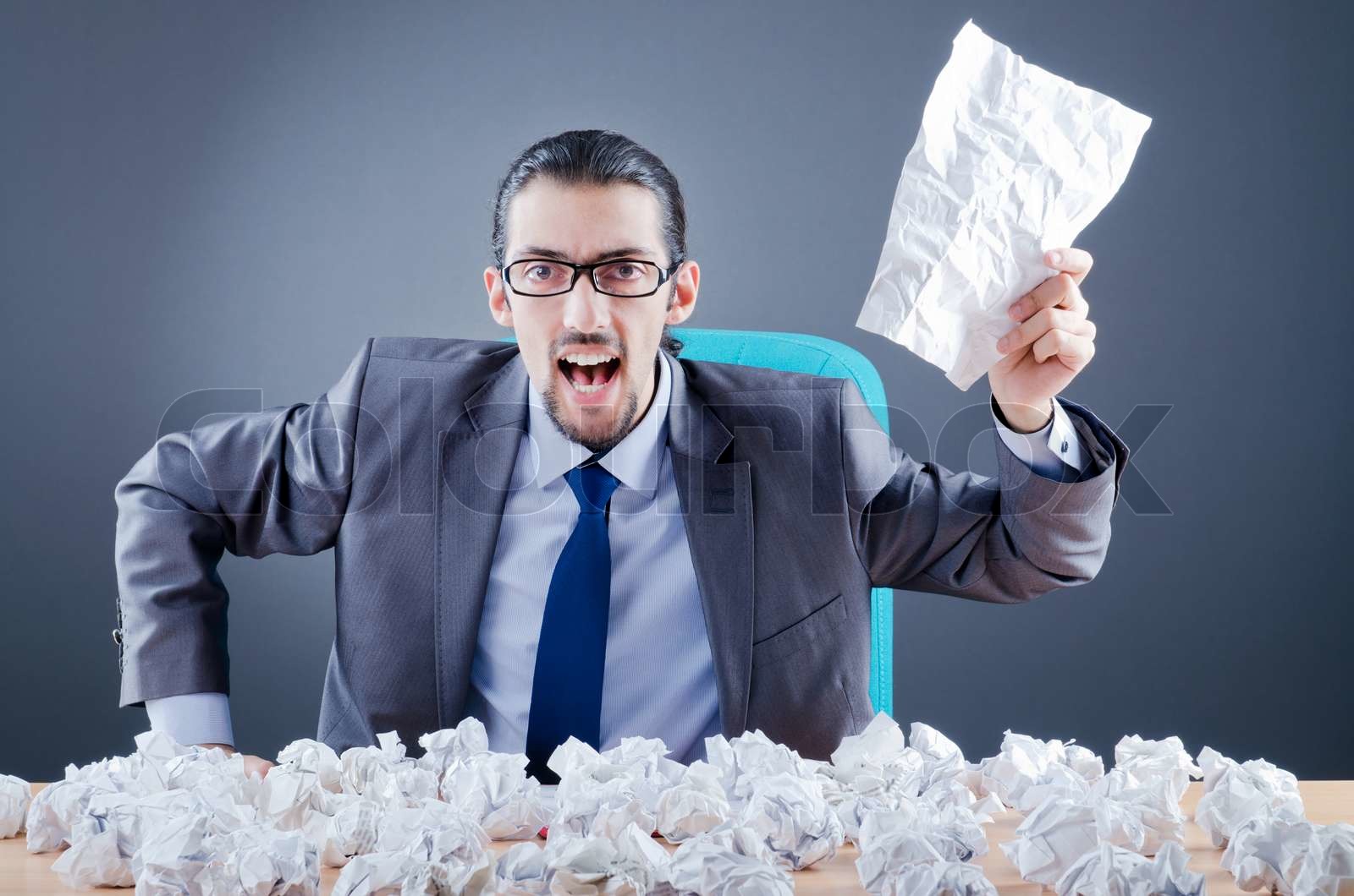 Businessman throwing paper away | Stock image | Colourbox