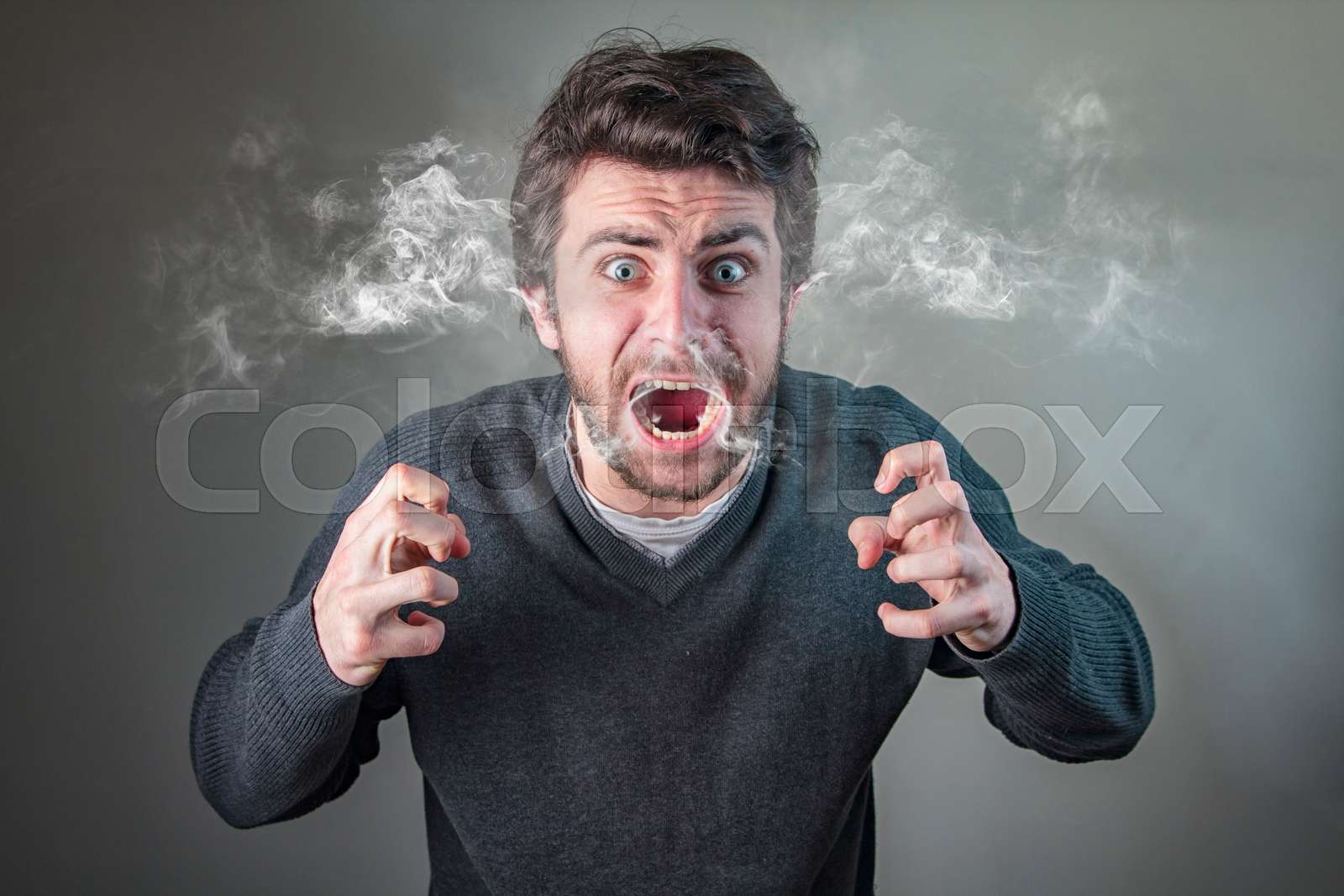 Furious man steaming with rage | Stock image | Colourbox