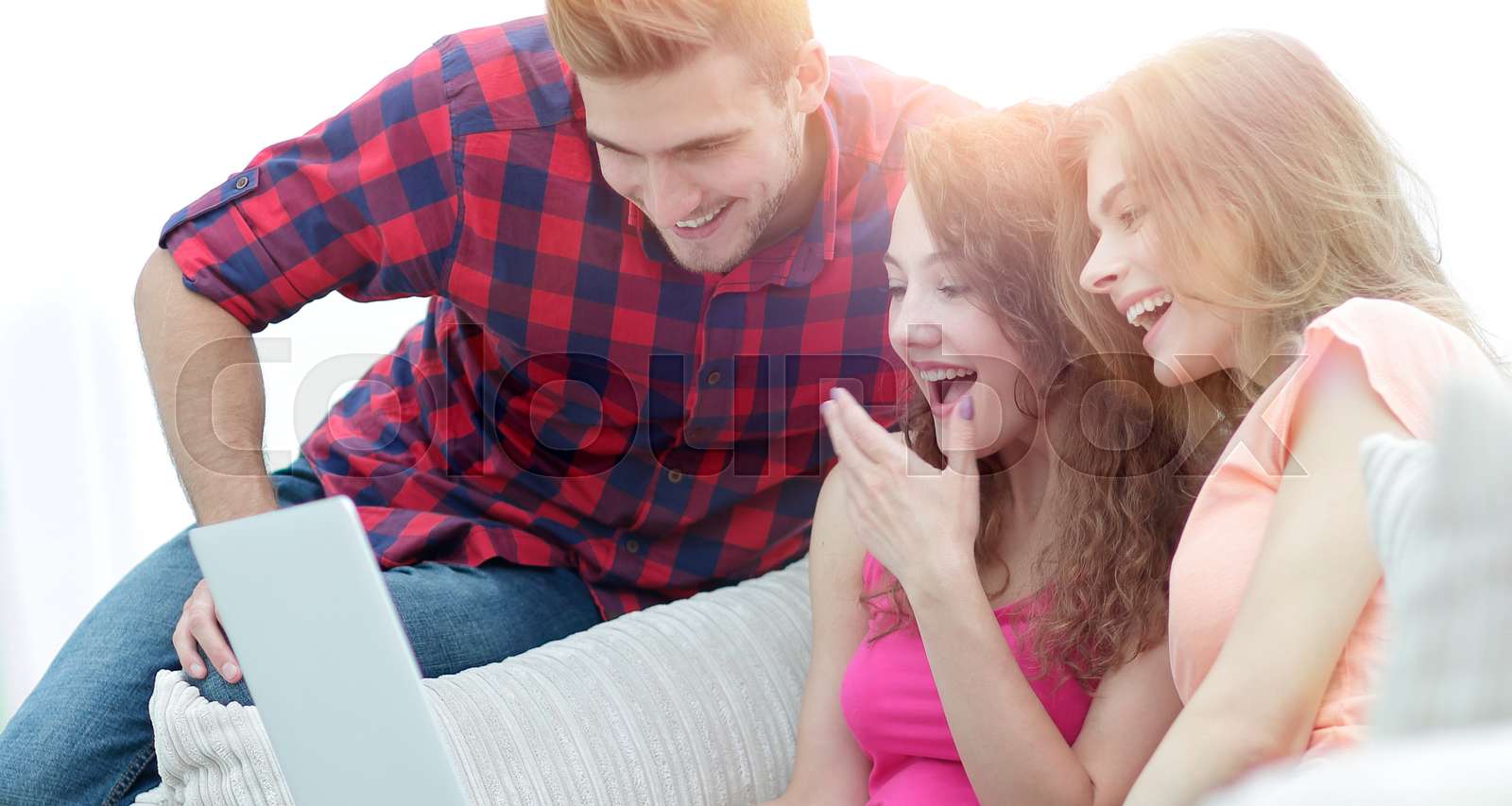 group of young people watching videos on the laptop. | Stock image ...