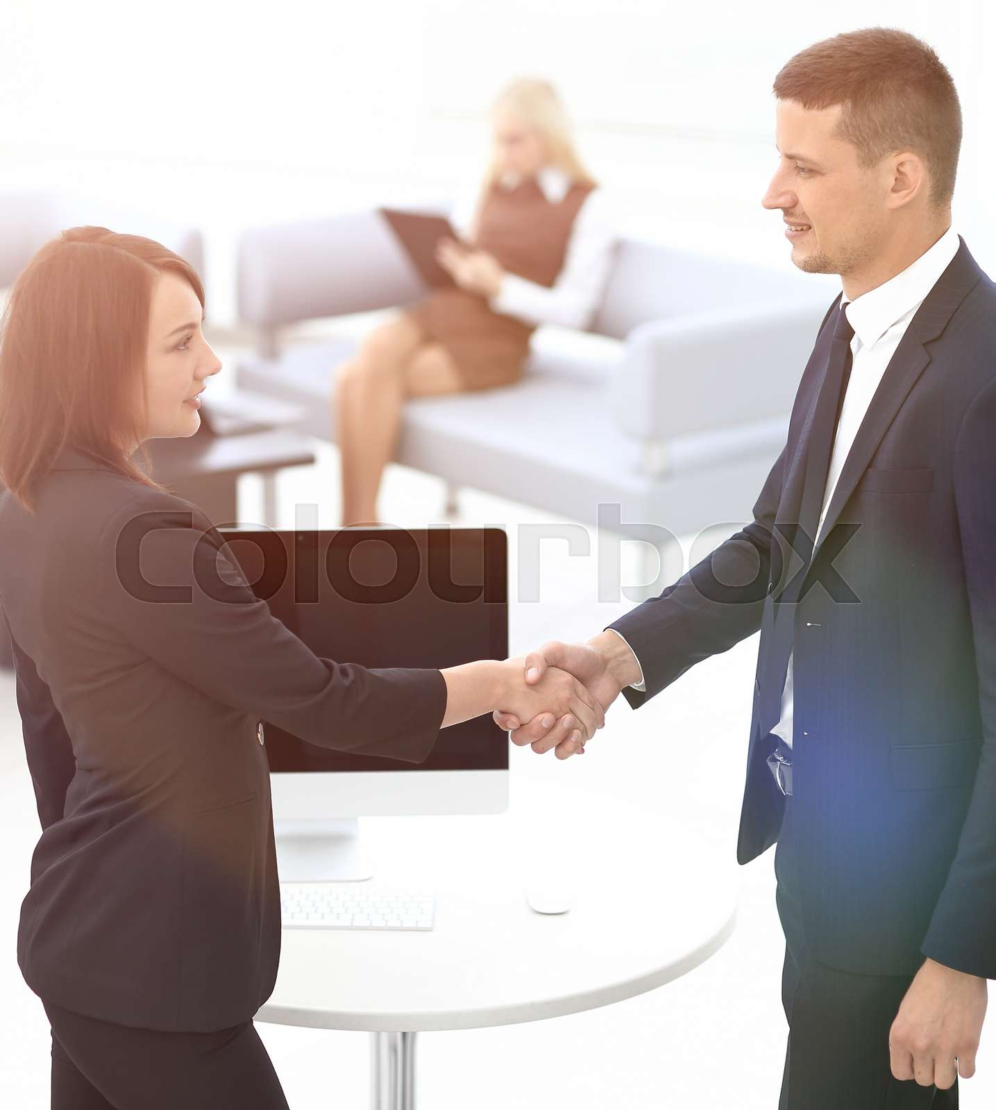 handshake business partners at the negotiating table. | Stock image ...