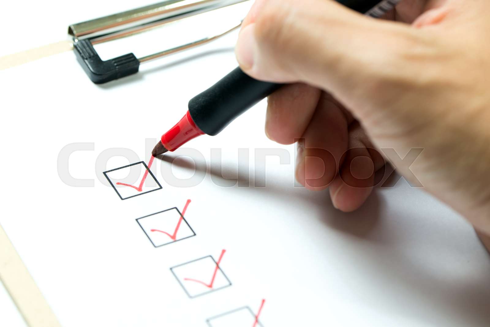 Checklist on clipboard | Stock image | Colourbox