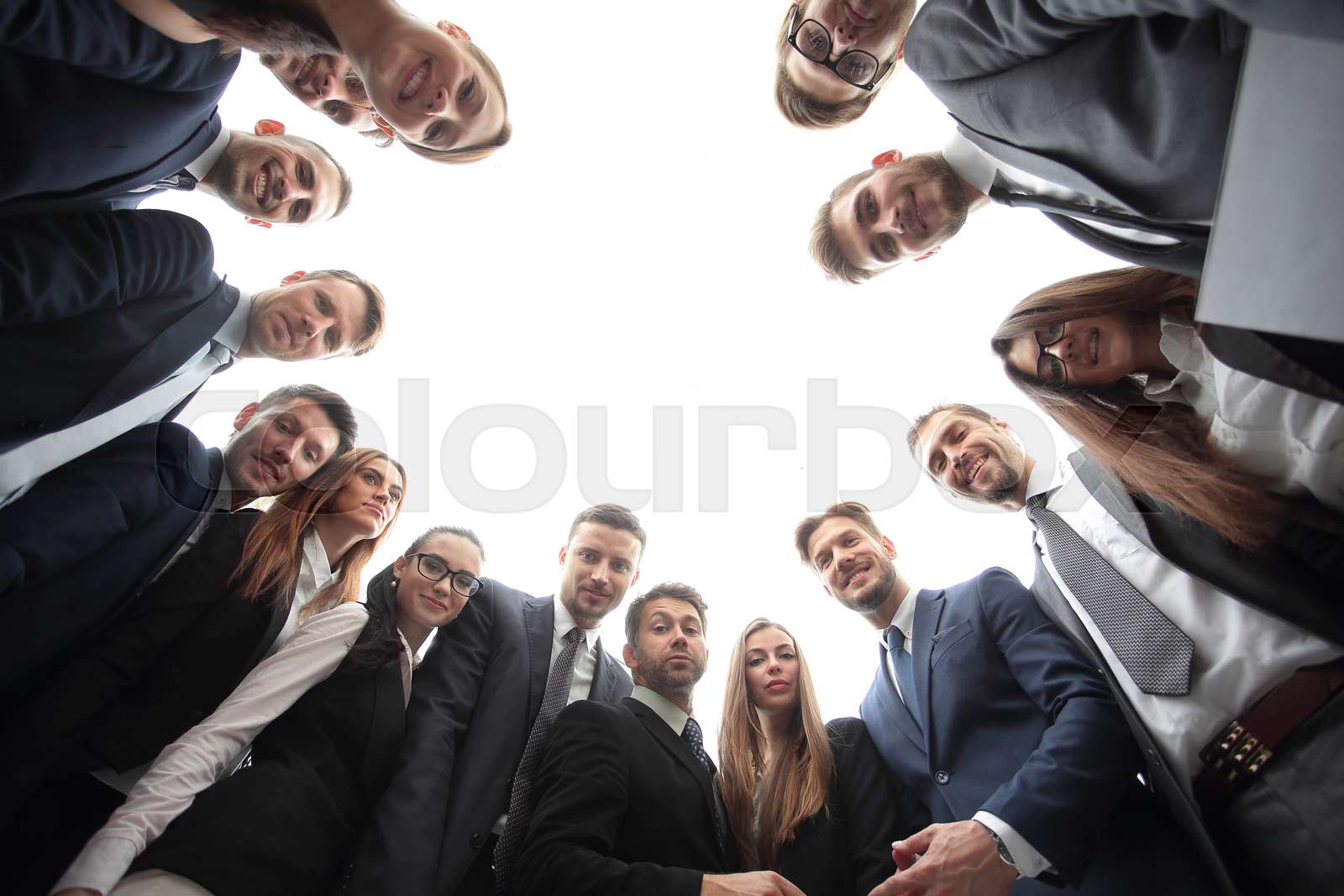 concept of team building.business team standing forming a circle ...