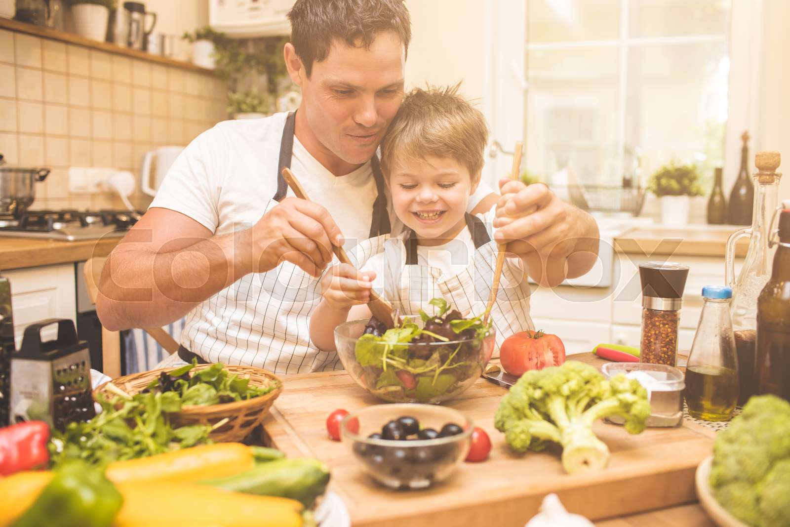 Father is cooking with his son | Stock image | Colourbox