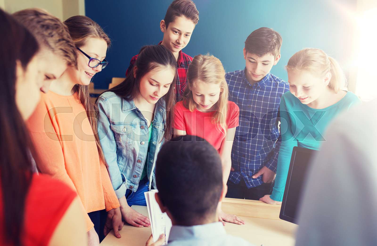 group of students and teacher at school classroom | Stock image | Colourbox
