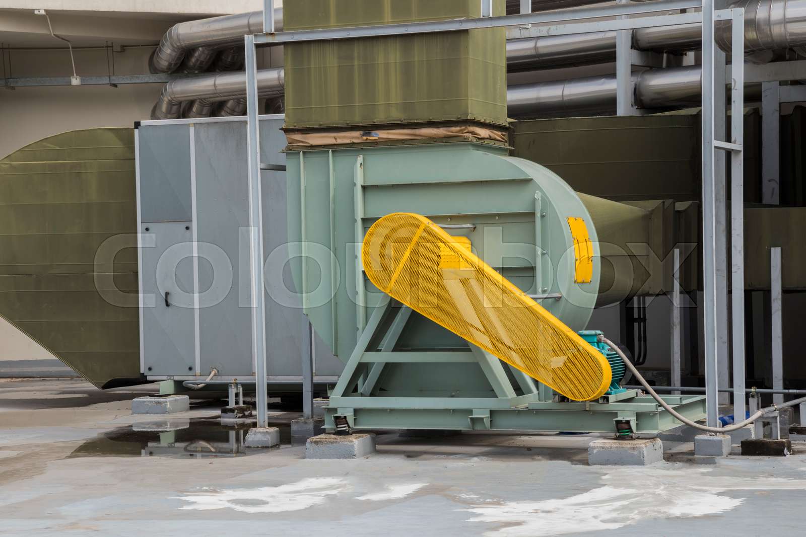 Yellow safety guard motor of air blower | Stock image | Colourbox