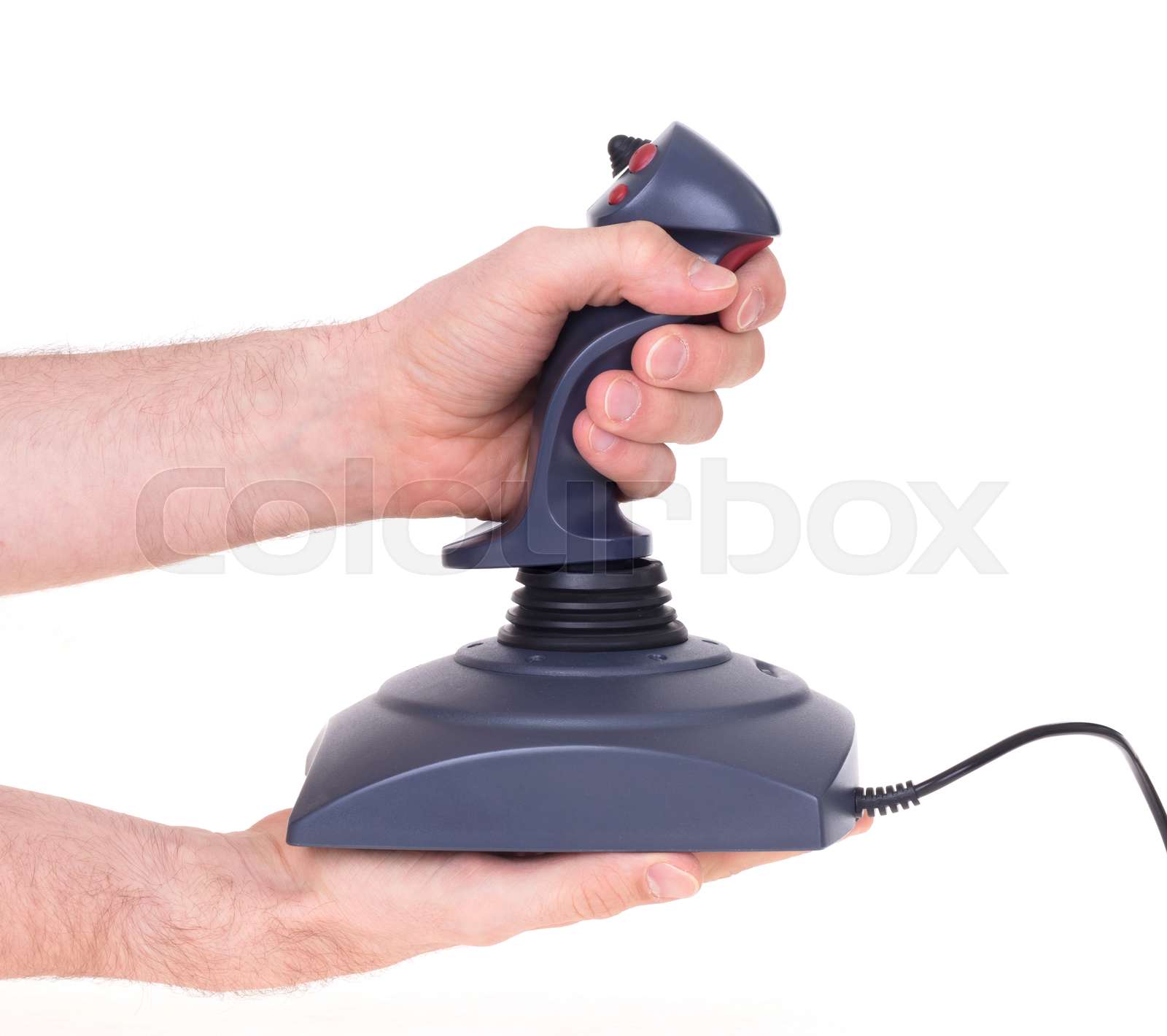 Hand holding gaming joystick | Stock image | Colourbox