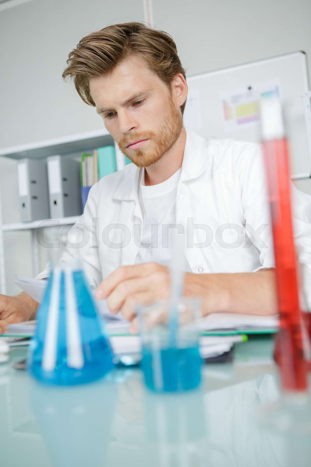 man in the laboratory with flasks | Stock image | Colourbox