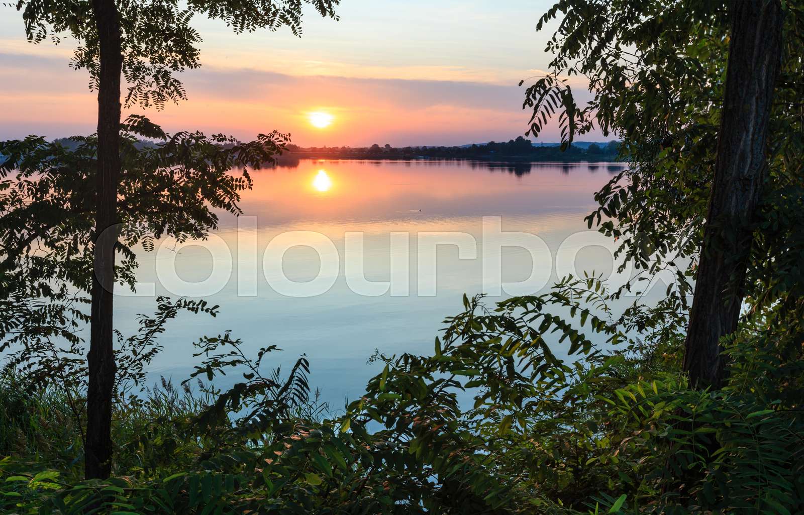 Summer sunset lake calm beach | Stock image | Colourbox