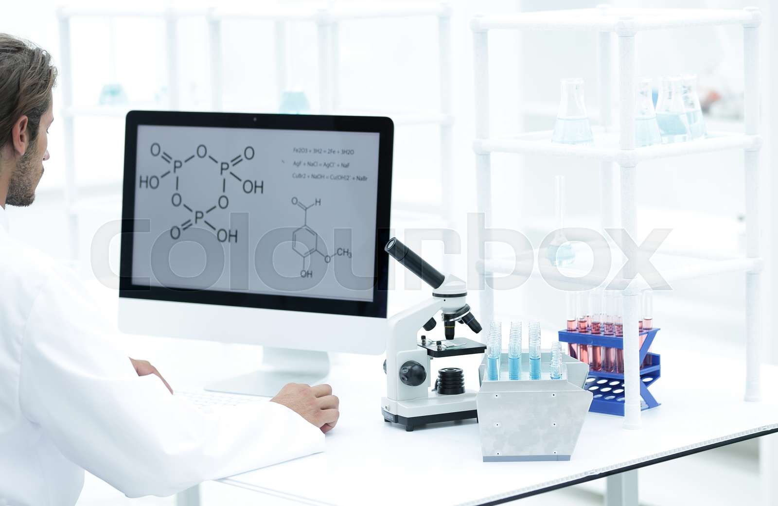 research scientist using computer chemistry laboratory | Stock image ...