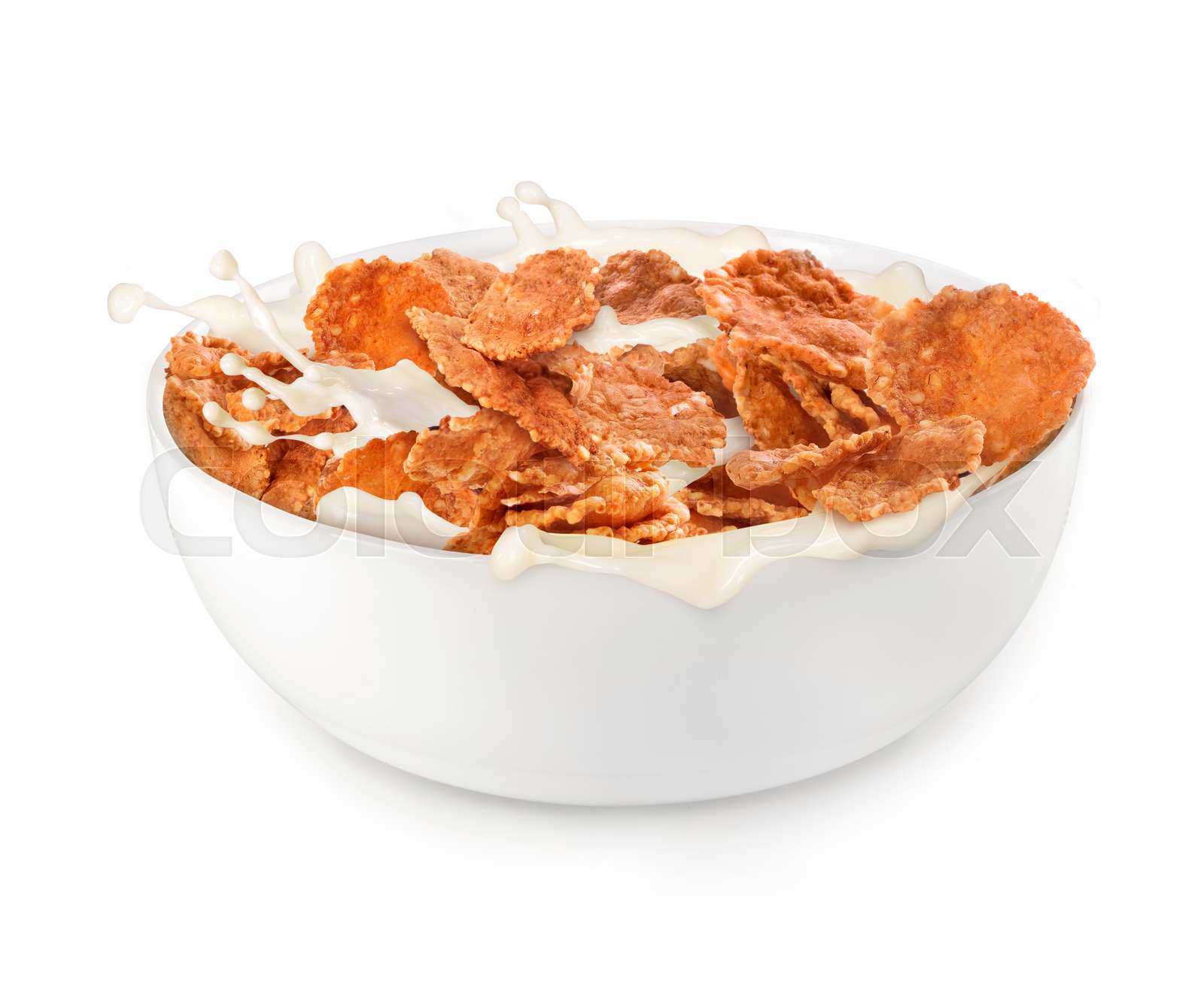 flakes in milk in a plate | Stock image | Colourbox