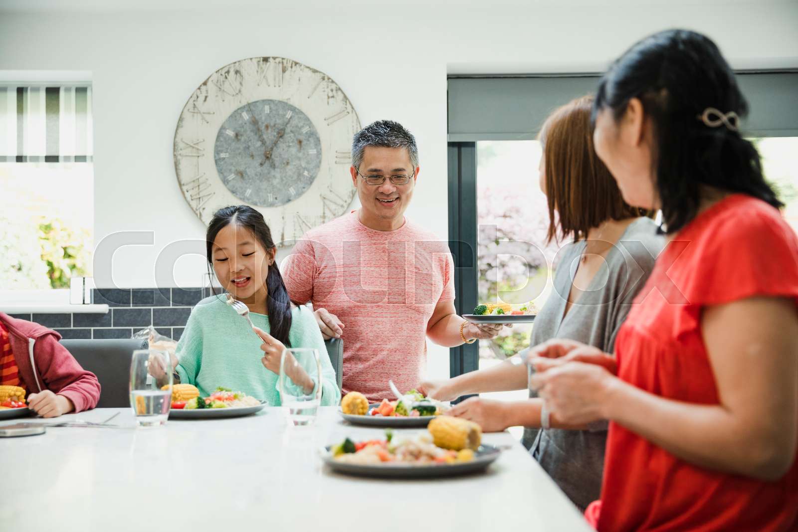Three Generation Family Having Dinner | Stock image | Colourbox