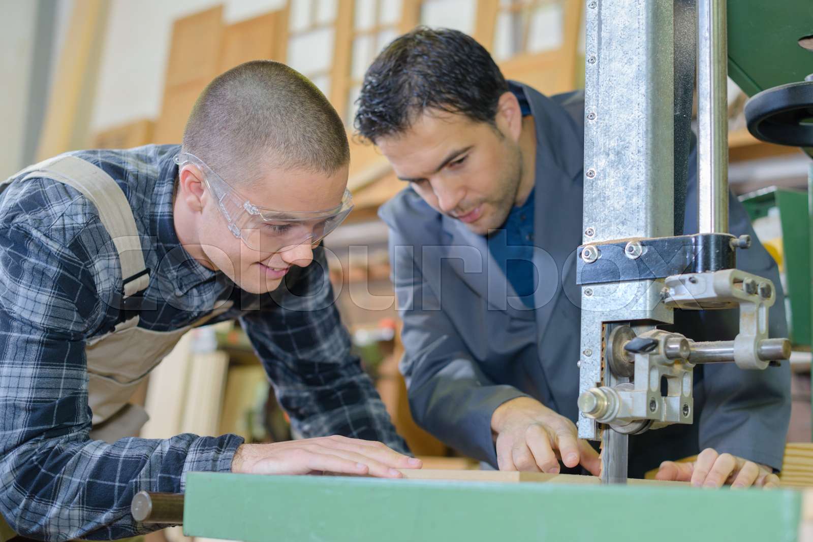 Men using industrial machinery | Stock image | Colourbox