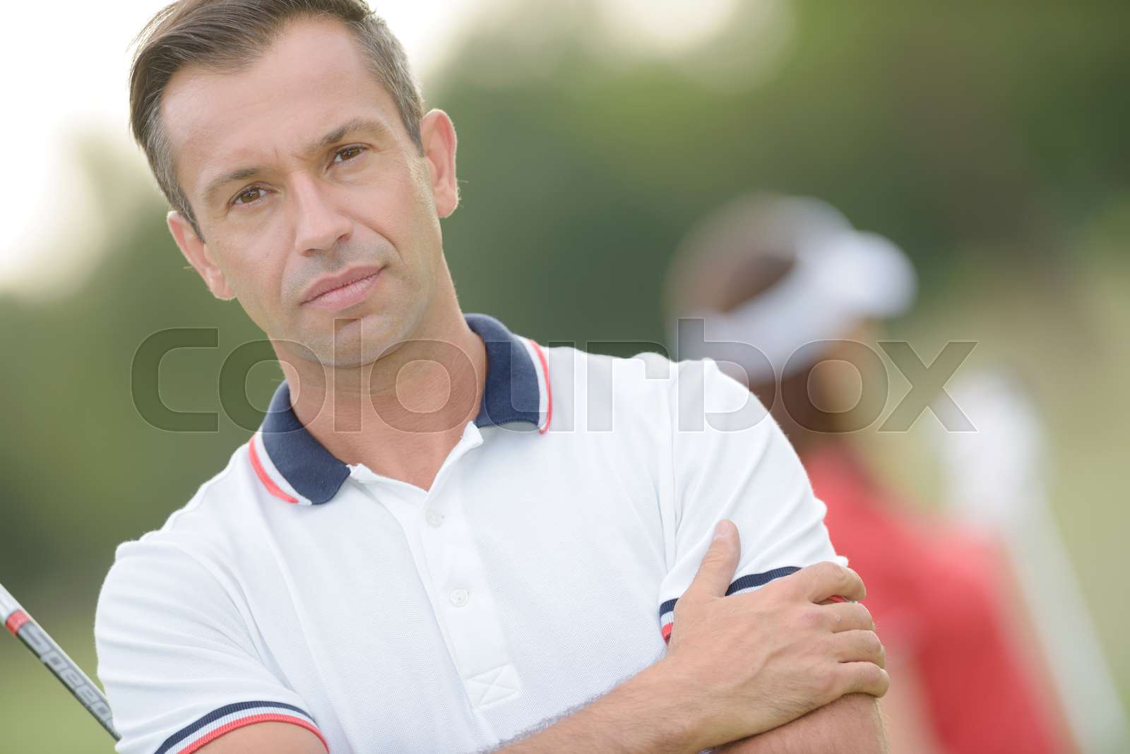 golfer posing on the golf course | Stock image | Colourbox
