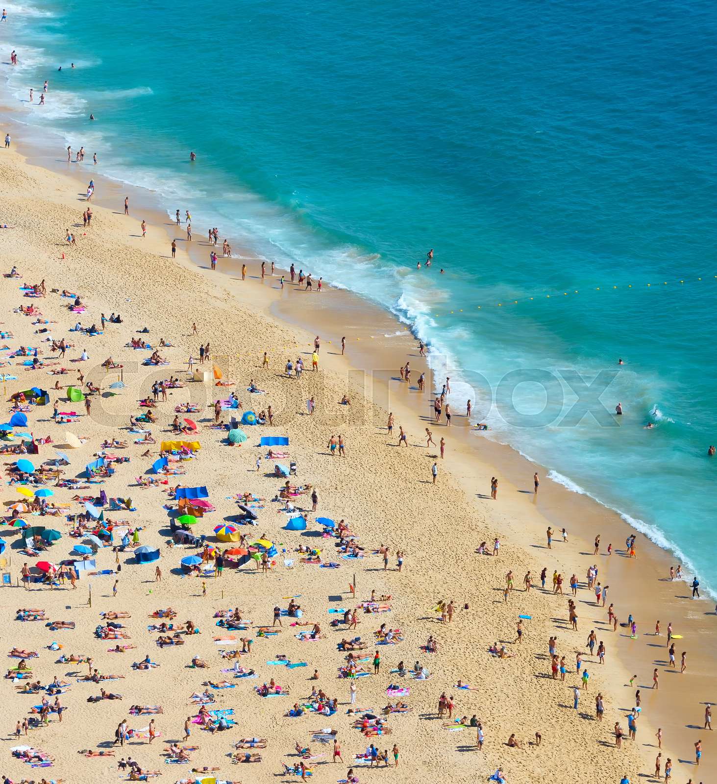 Crowded ocean beach. Aerial view | Stock image | Colourbox