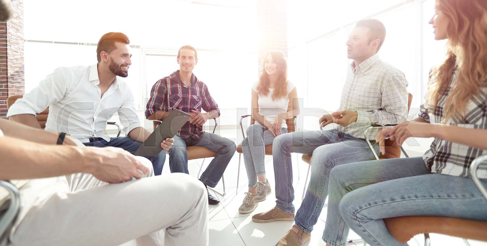 team sitting in a lesson on team building | Stock image | Colourbox