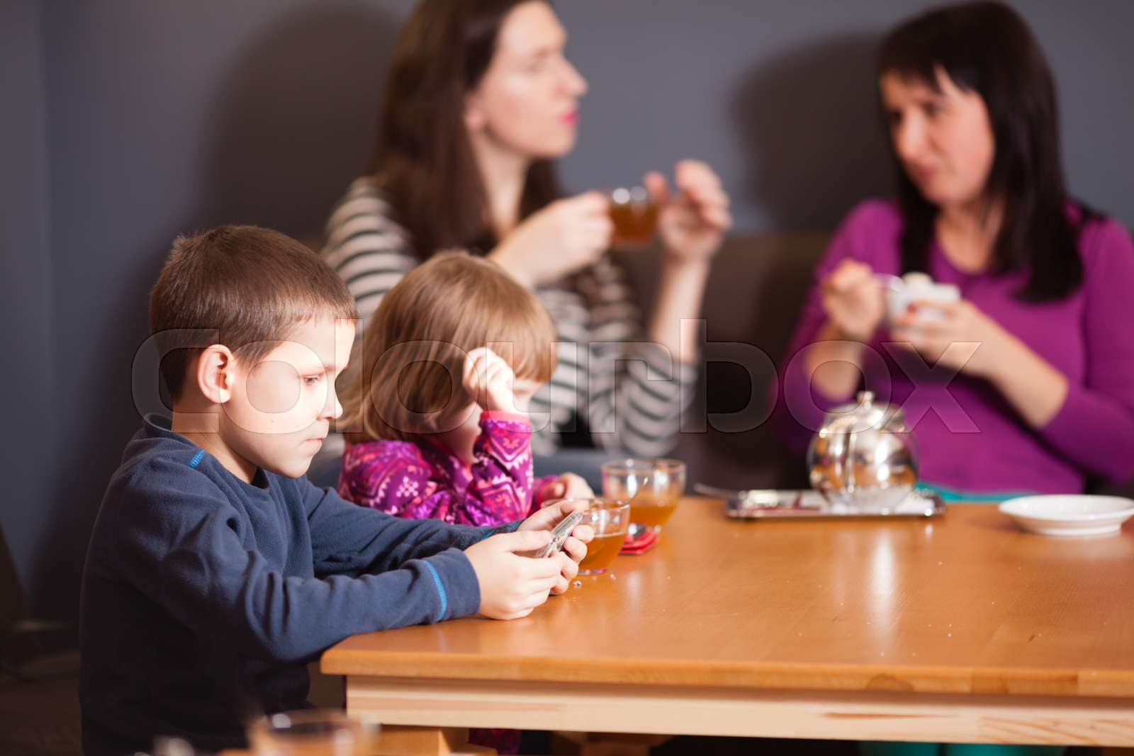 The children at the table | Stock image | Colourbox