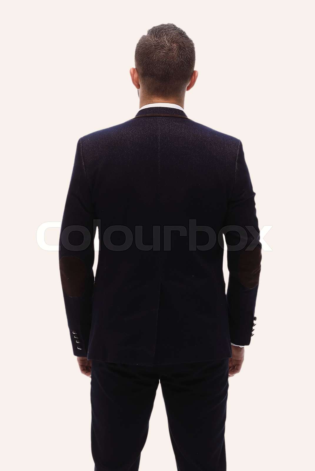 in full growth.rear view of a successful businessman. | Stock image ...