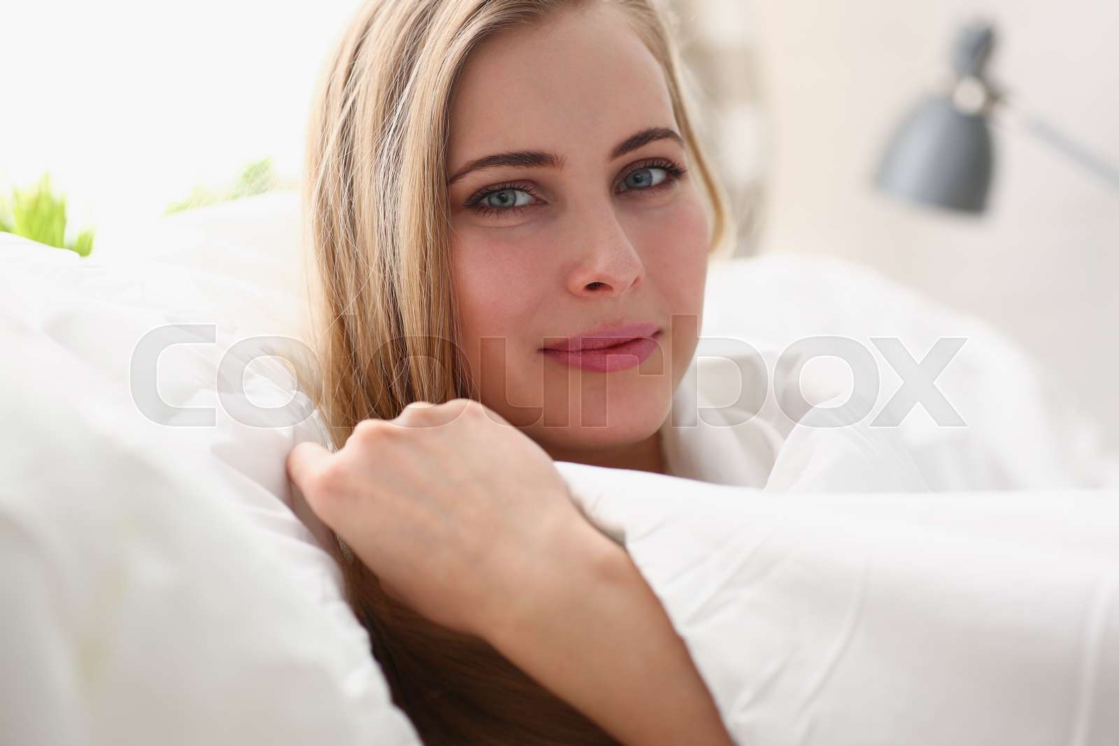 Young Beautiful Woman Waking Up In The Morning Stock Image Colourbox