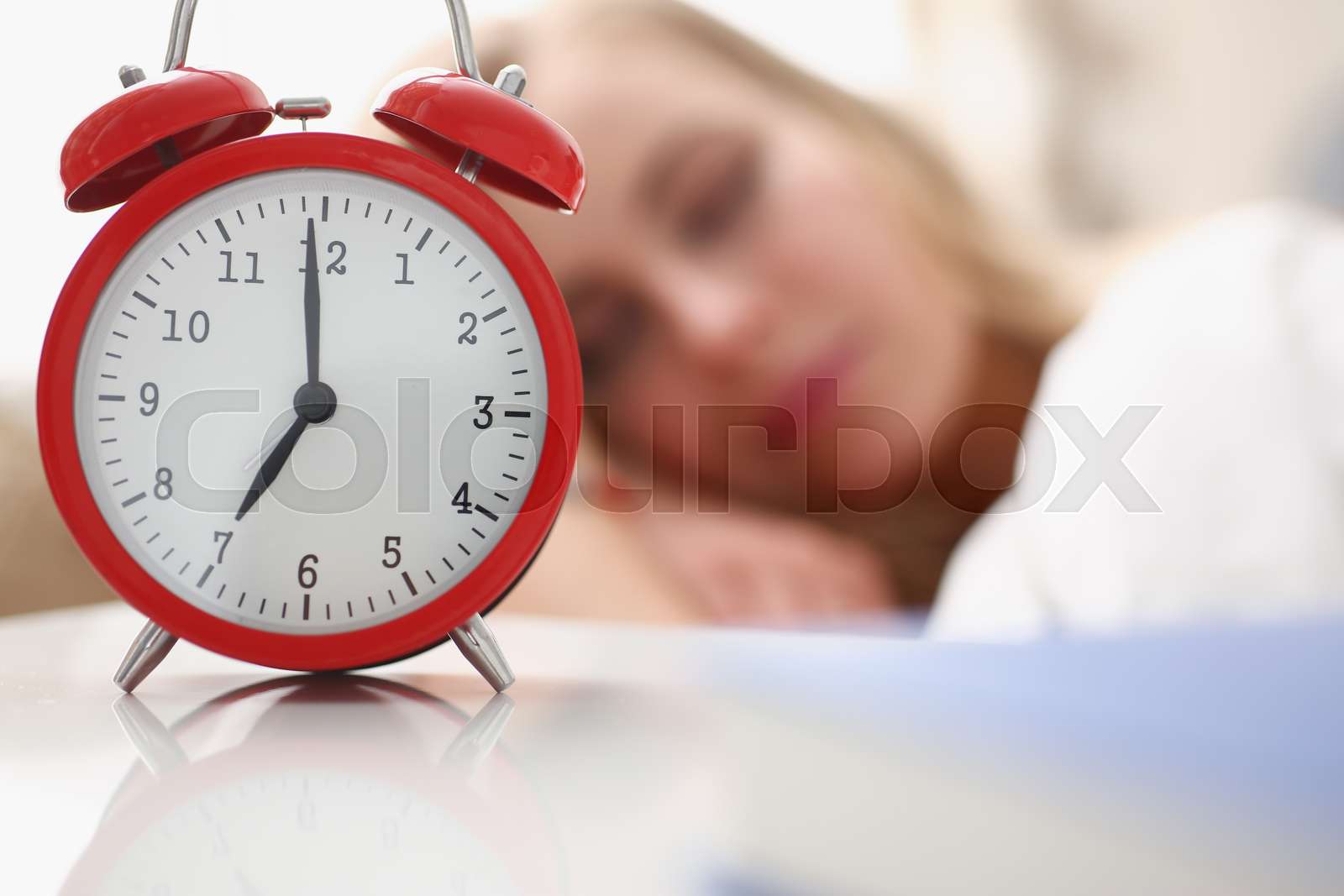 Young beautiful woman waking up in the morning alarm | Stock image ...