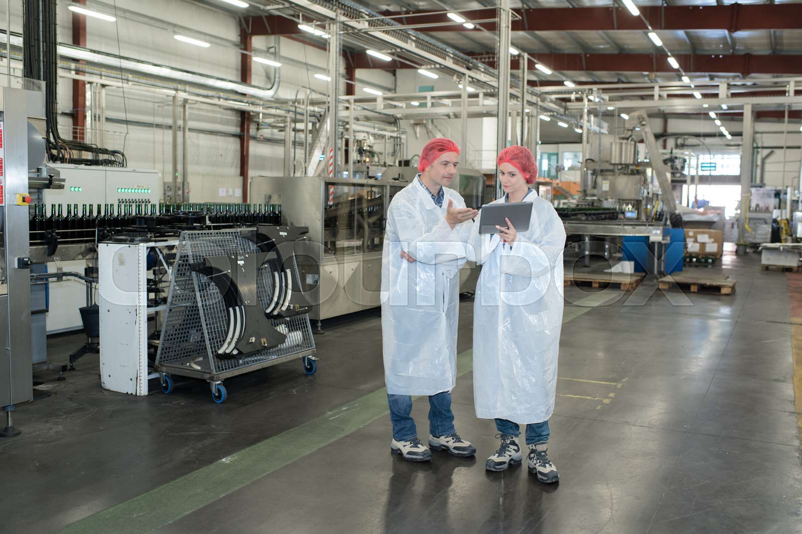 Two people in factory | Stock image | Colourbox