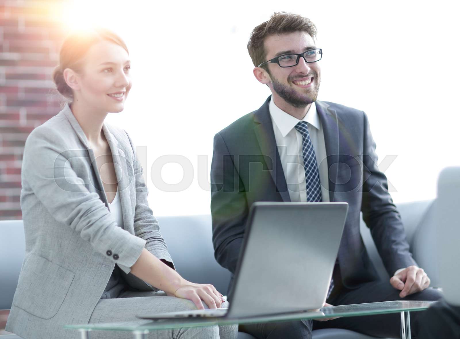 members of the business team talking to a client | Stock image | Colourbox