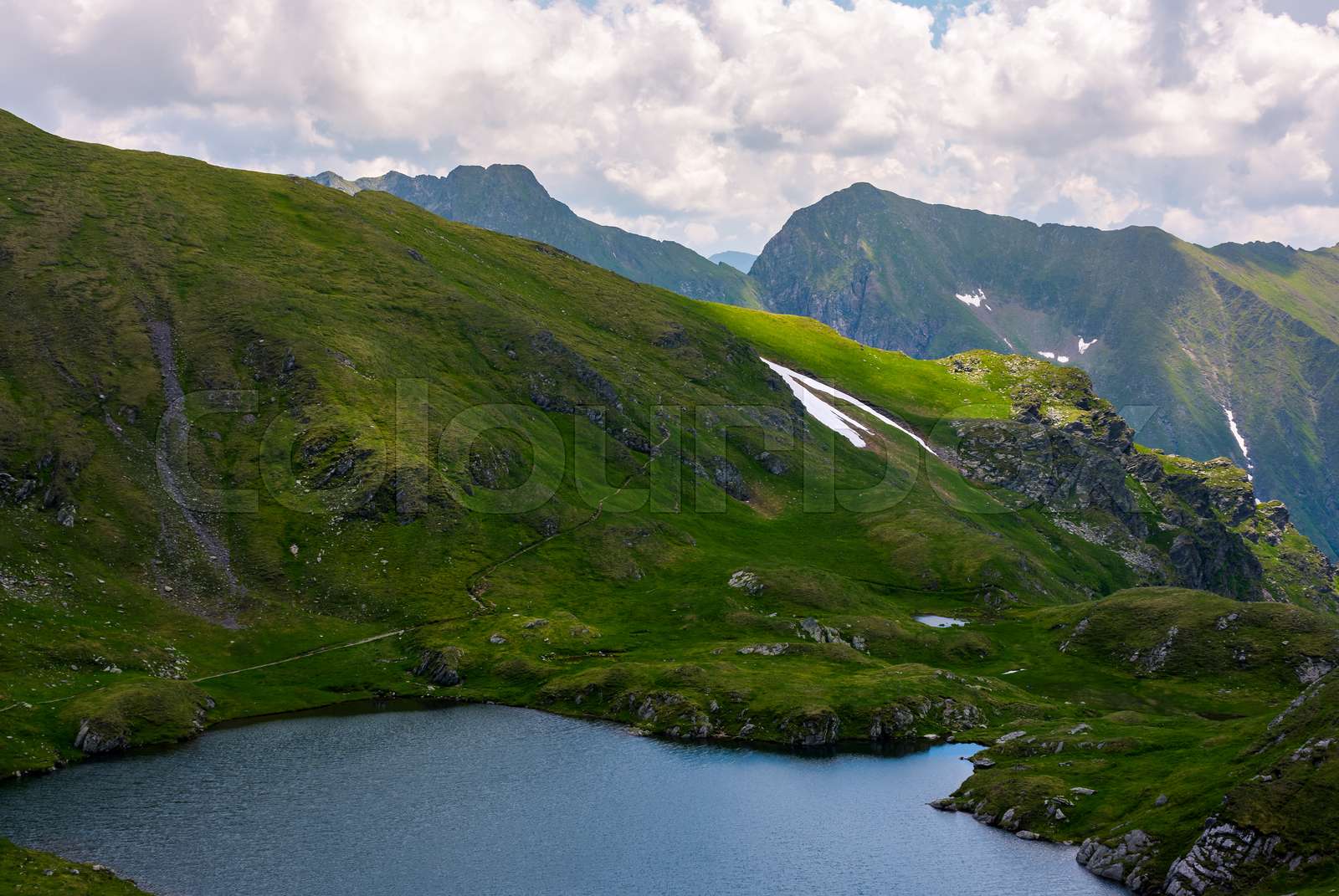 lake Capra in Fagarasan mountains of Romania | Stock image | Colourbox