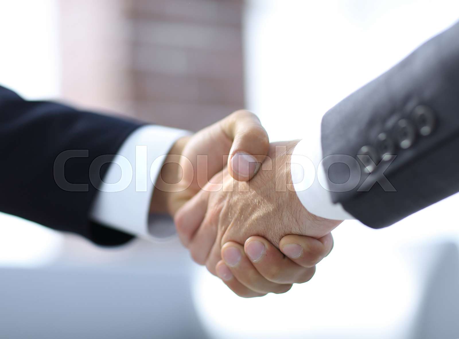 closeup.handshake of business partners | Stock image | Colourbox