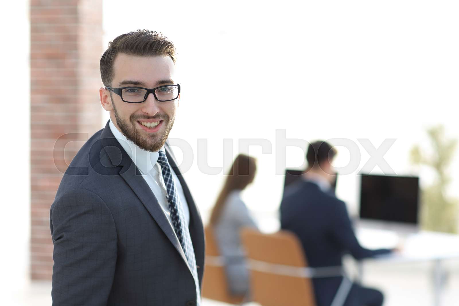 modern businessman standing in office. | Stock image | Colourbox