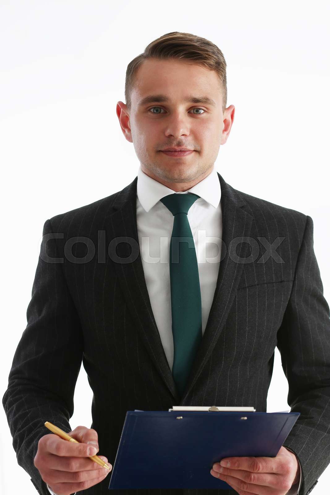 Handsome man in suit and tie look in camera chest | Stock image | Colourbox