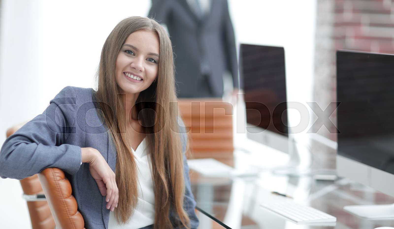 pretty woman employee of the company | Stock image | Colourbox