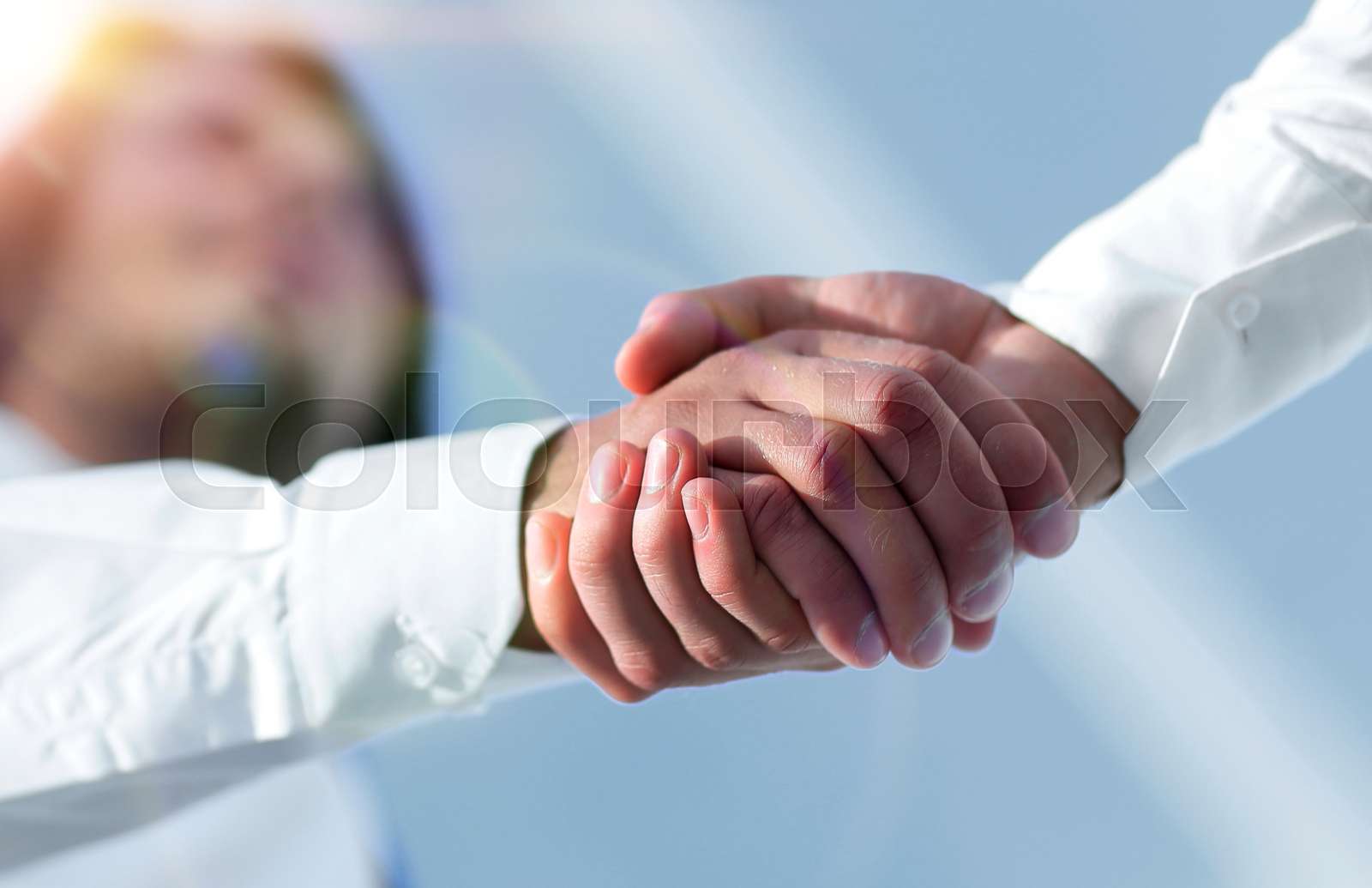 Close-up photo of handshake of two successful businessmen | Stock image ...