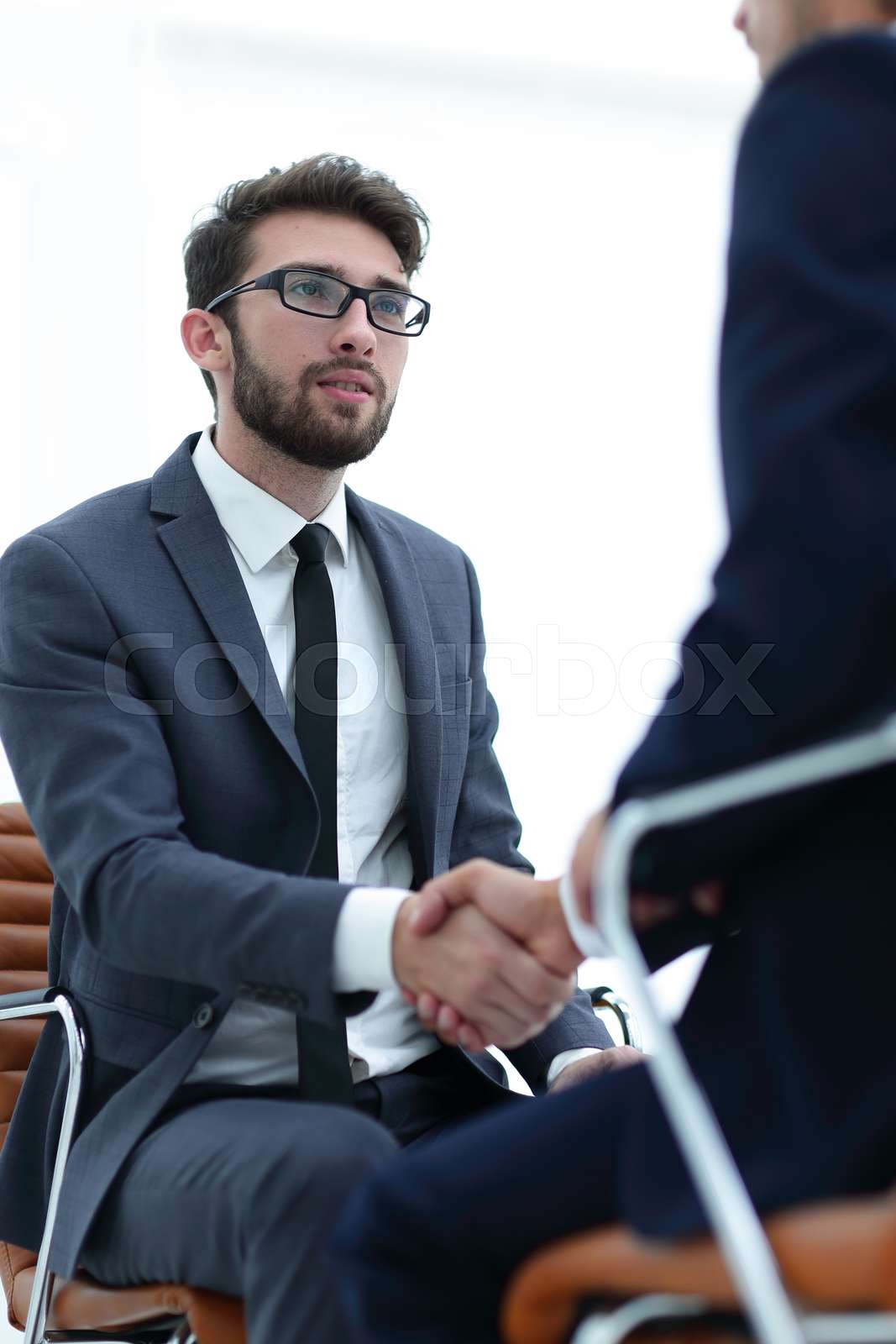 successful meetings of businessmen in the office | Stock image | Colourbox