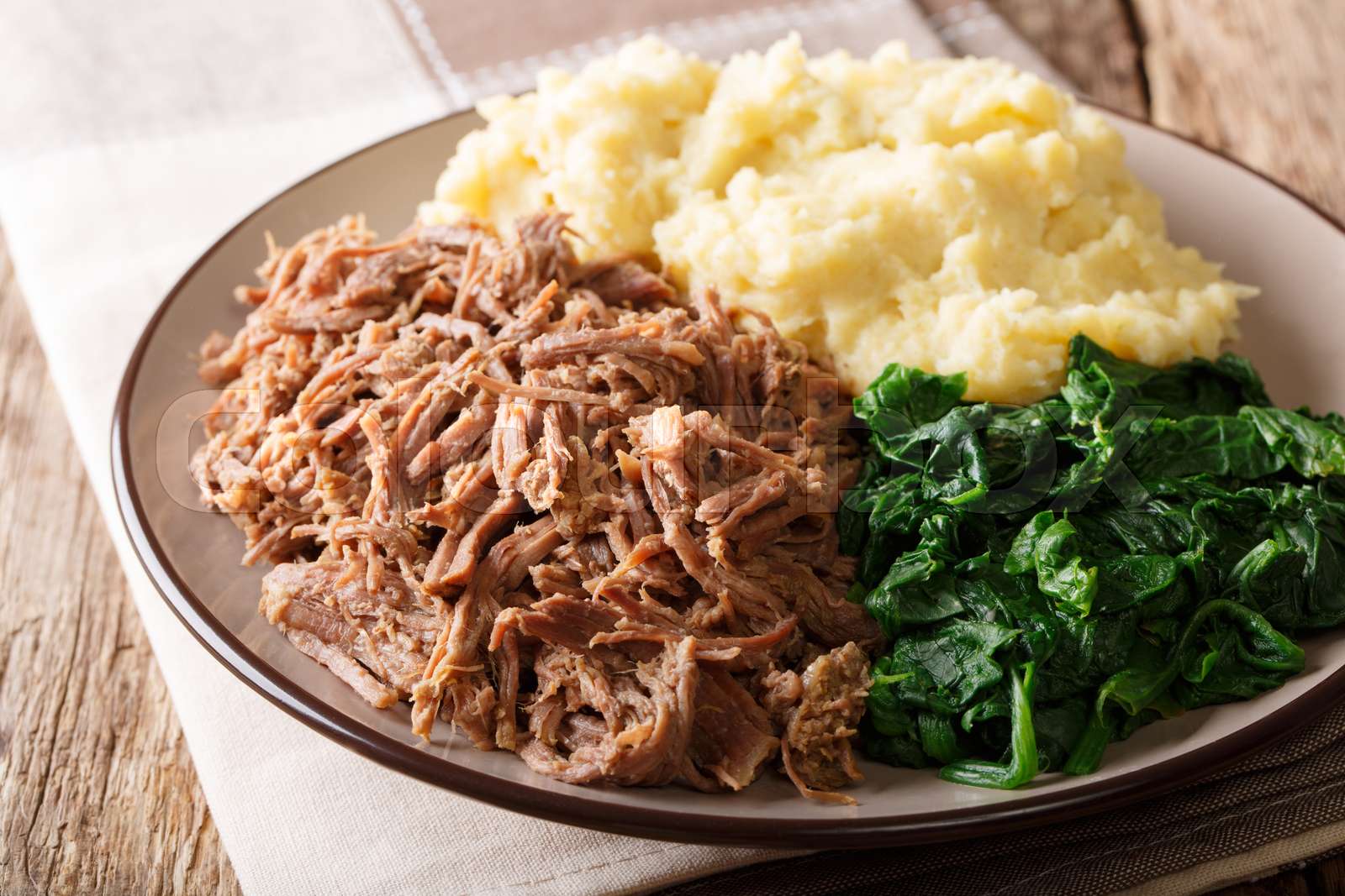 Botswana cuisine: seswaa beef stew with pap porridge and spinach close ...