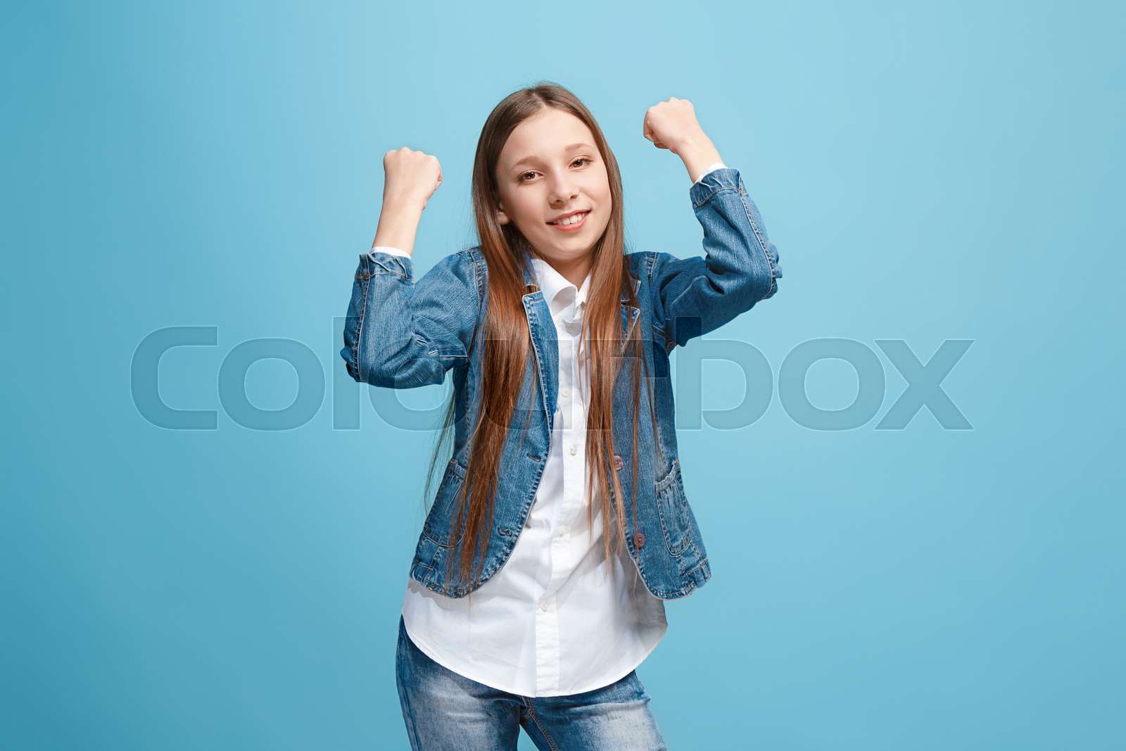 Happy success teen girl celebrating being a winner. Dynamic energetic ...