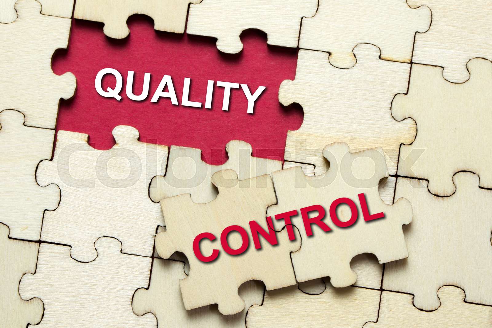 Puzzle pieces with word quality control | Stock image | Colourbox