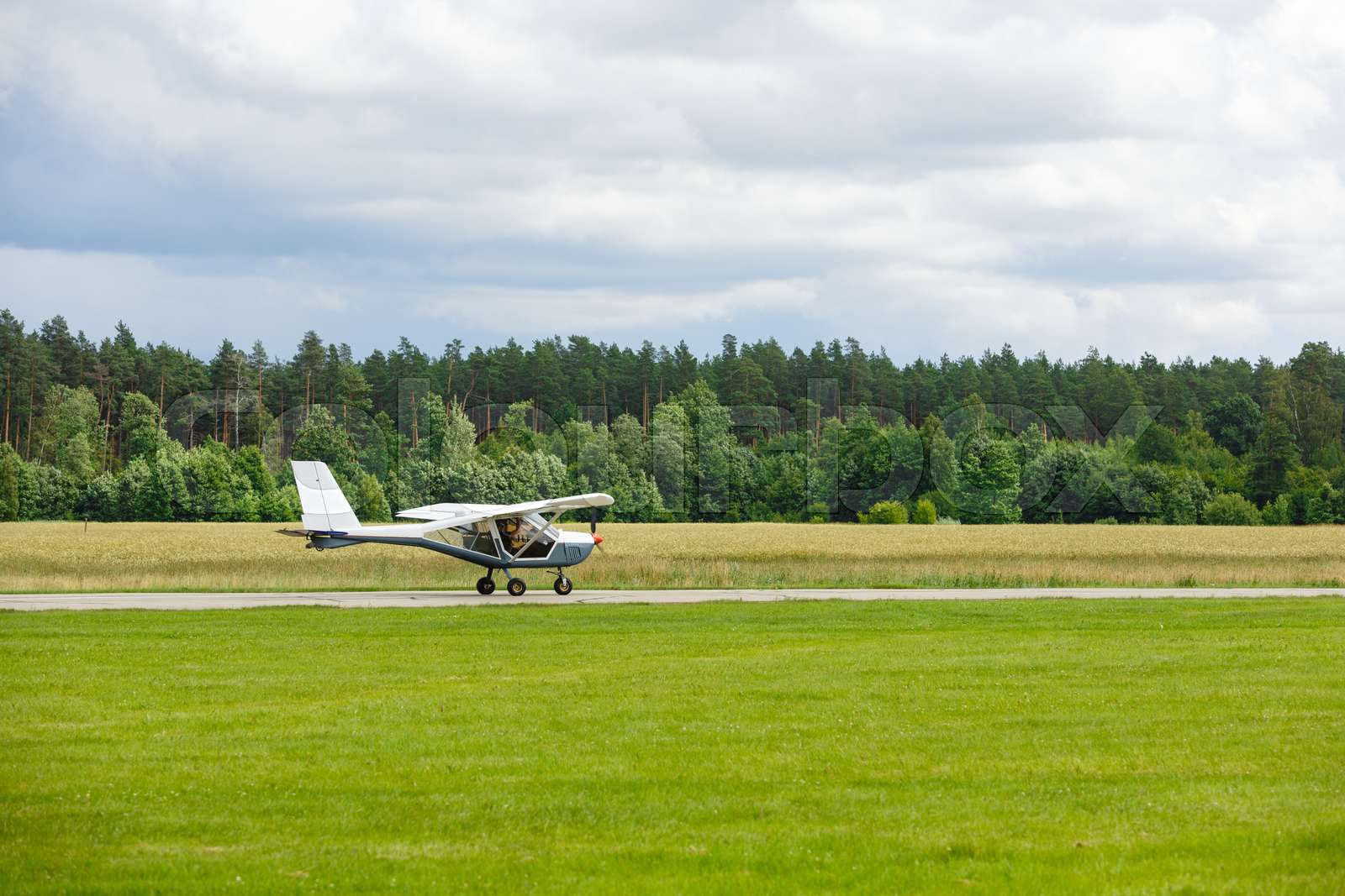 small plane taking off | Stock image | Colourbox