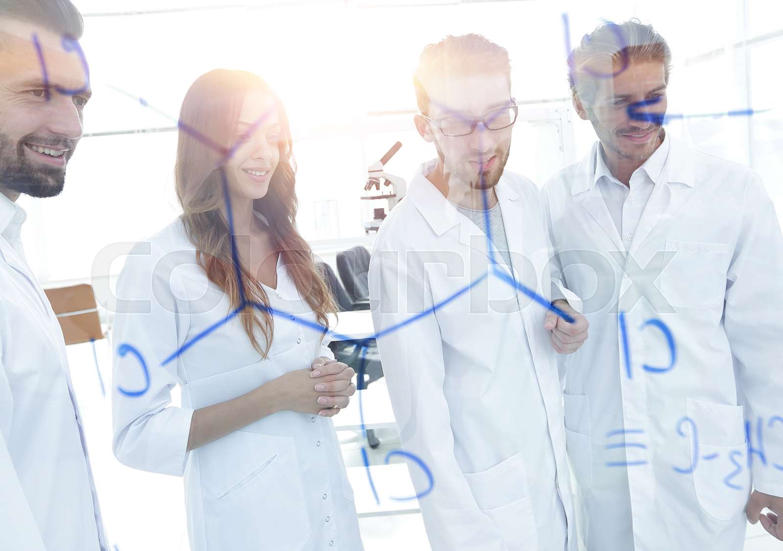 group of laboratory employees. | Stock image | Colourbox