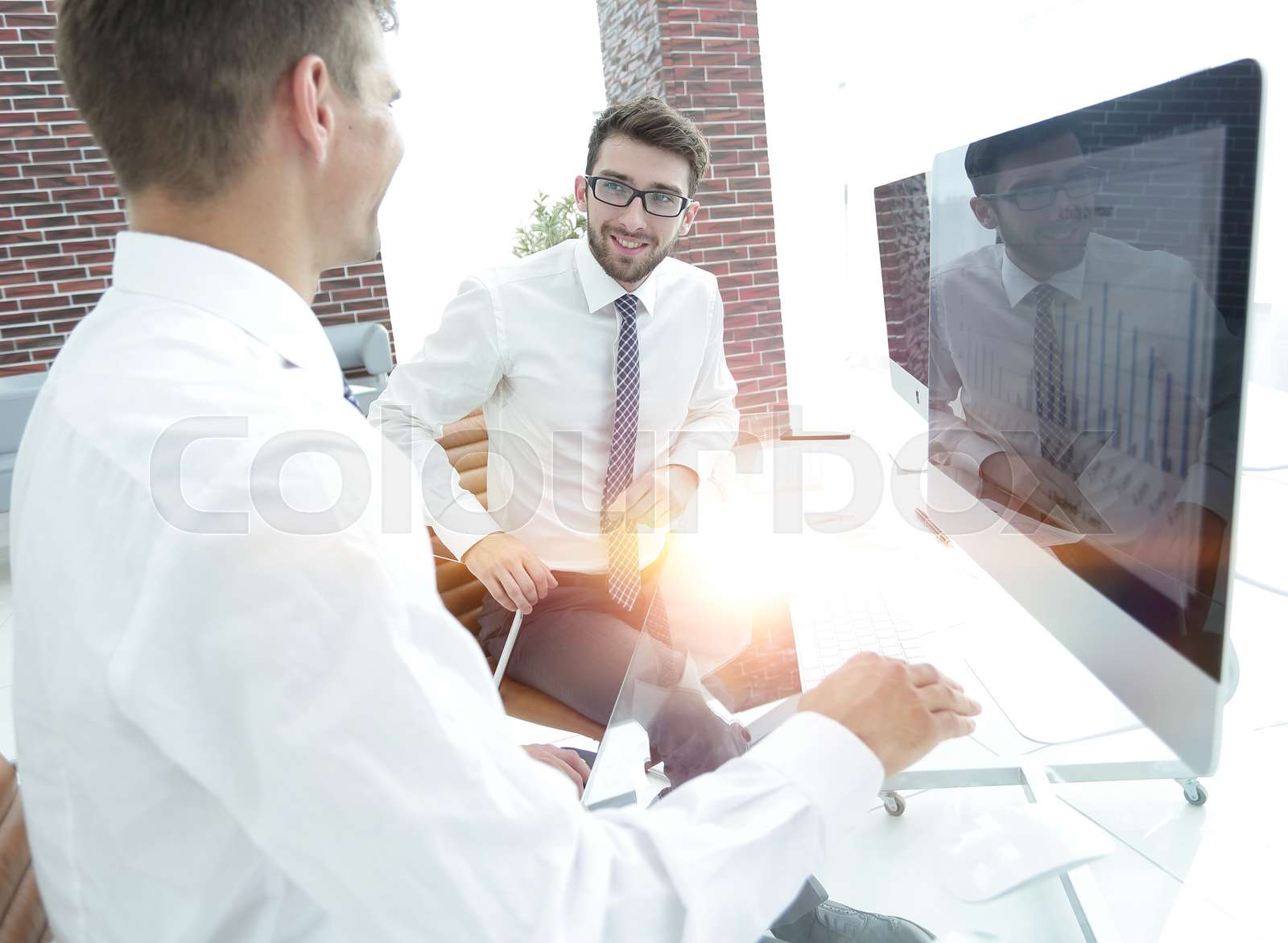 company's employees at the workplace | Stock image | Colourbox