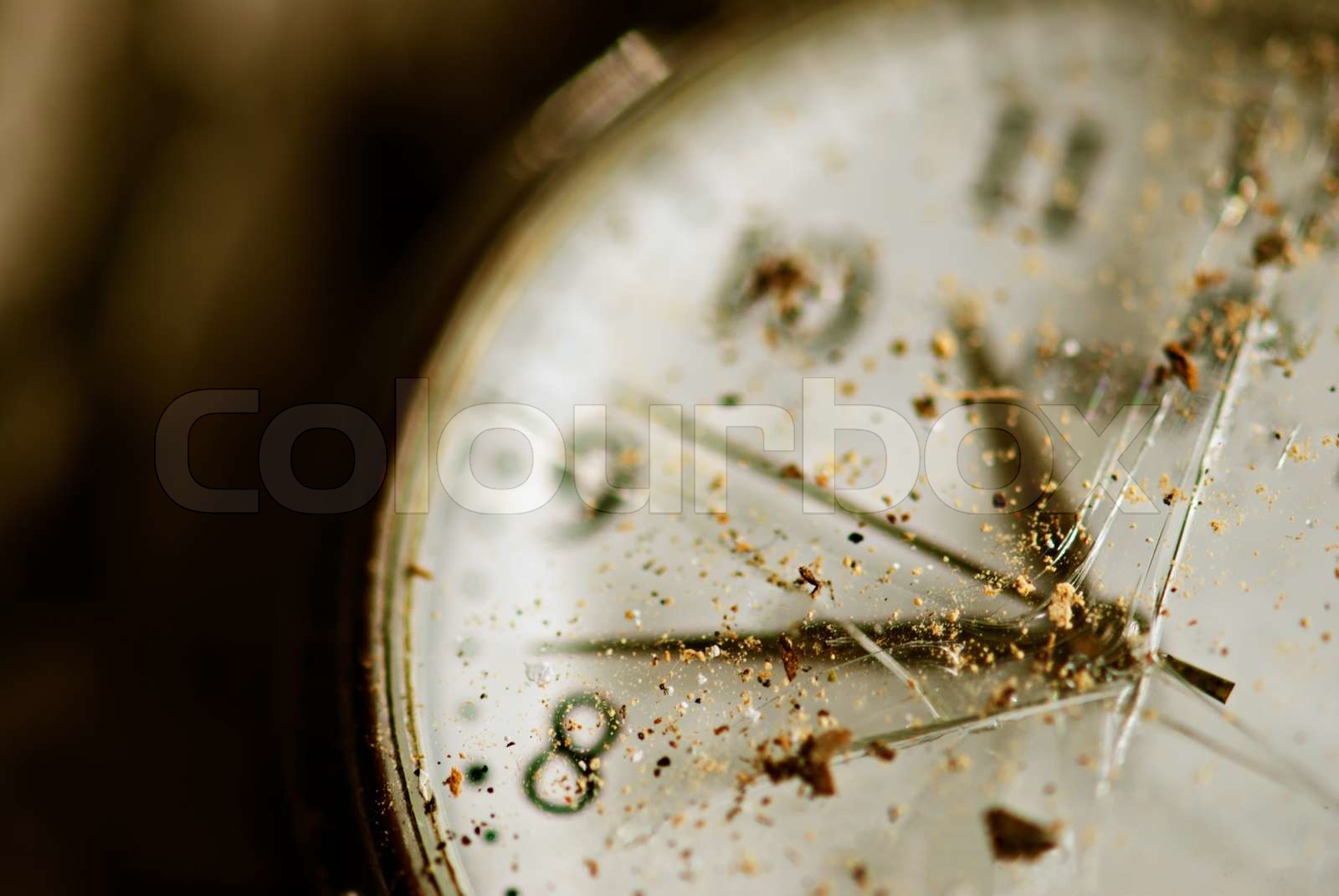 Old dusty pocket clock with broken glass Shallow depth of field Special ...