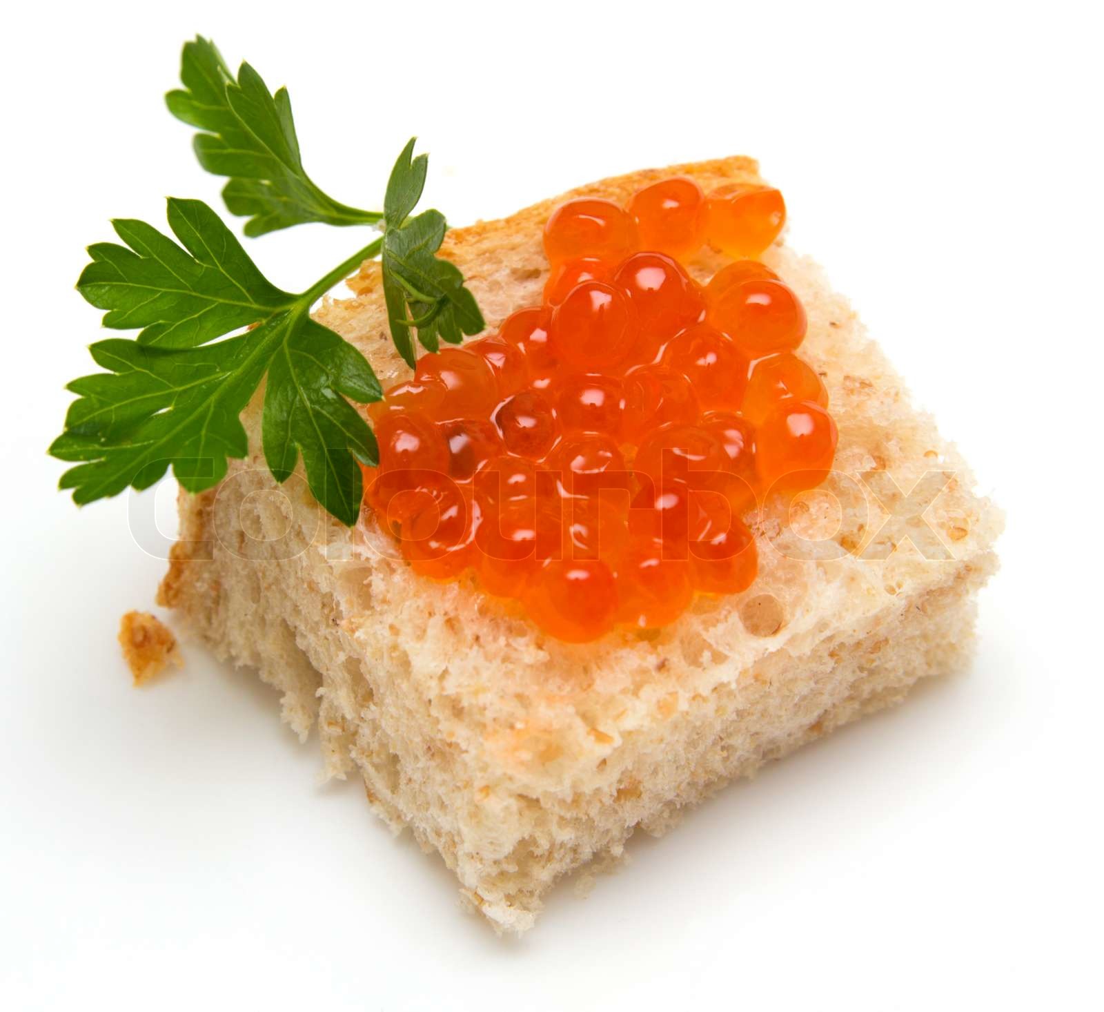 red caviar on bread with parsley | Stock image | Colourbox