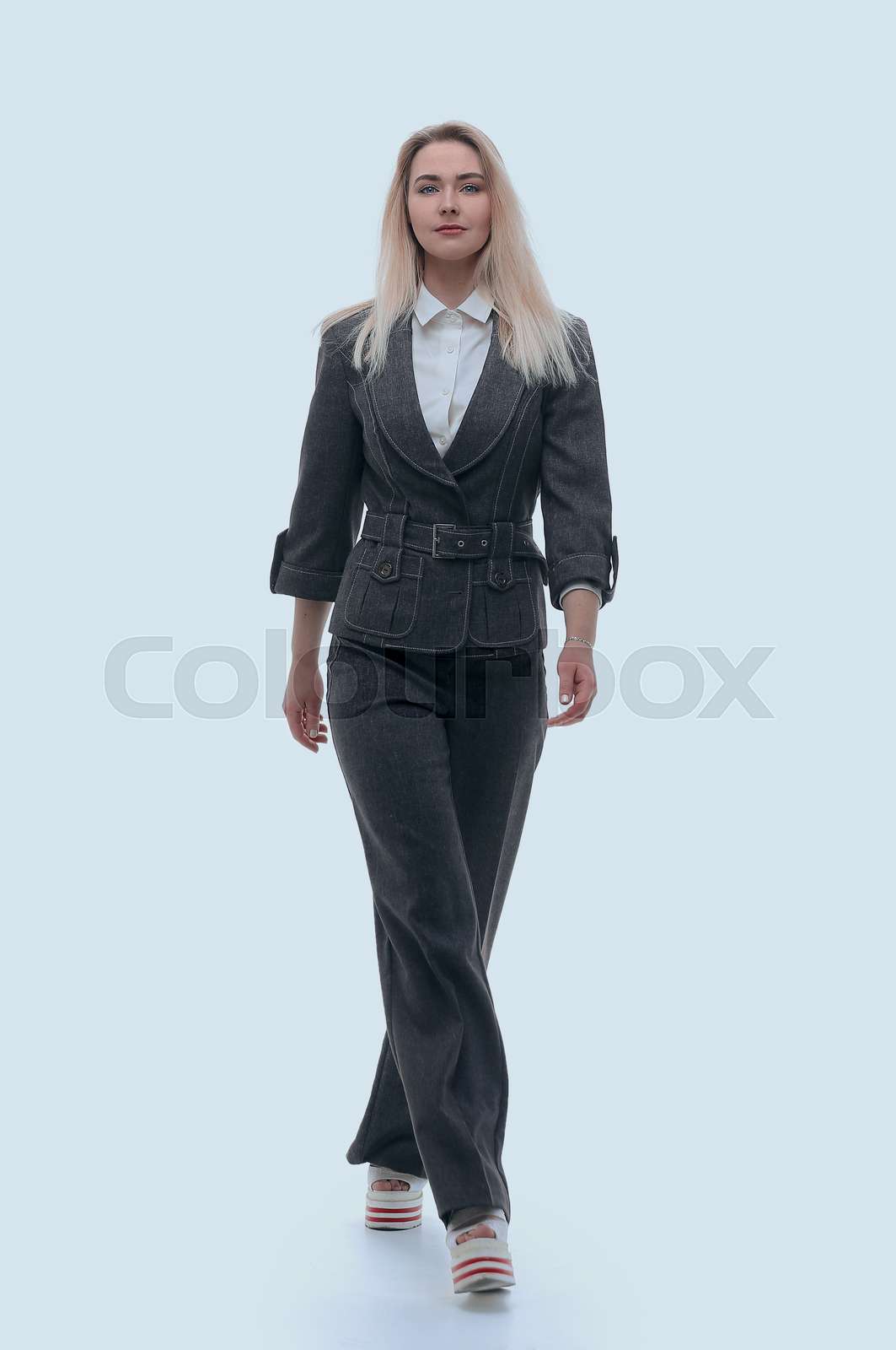 confident business woman walking forward. | Stock image | Colourbox