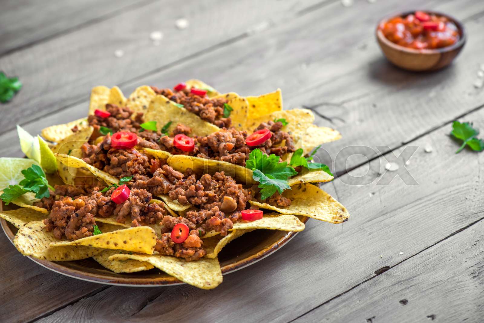 Nachos chips and ground beef | Stock image | Colourbox