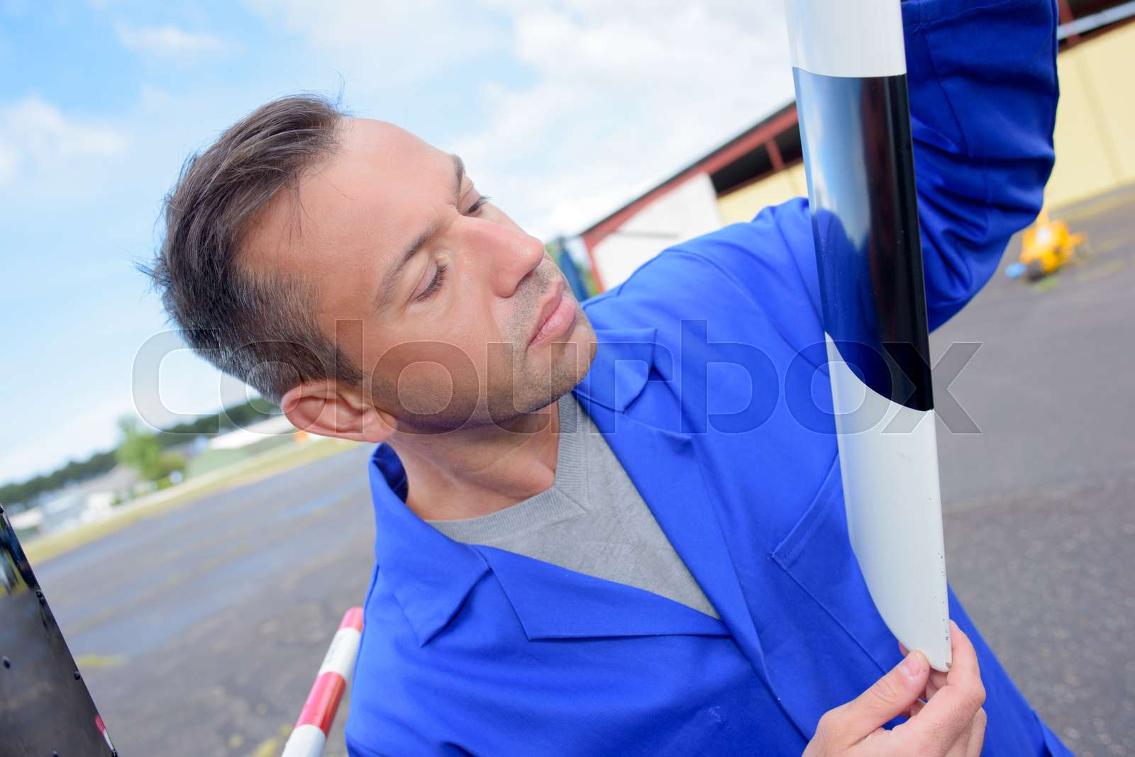 man inspecting | Stock image | Colourbox