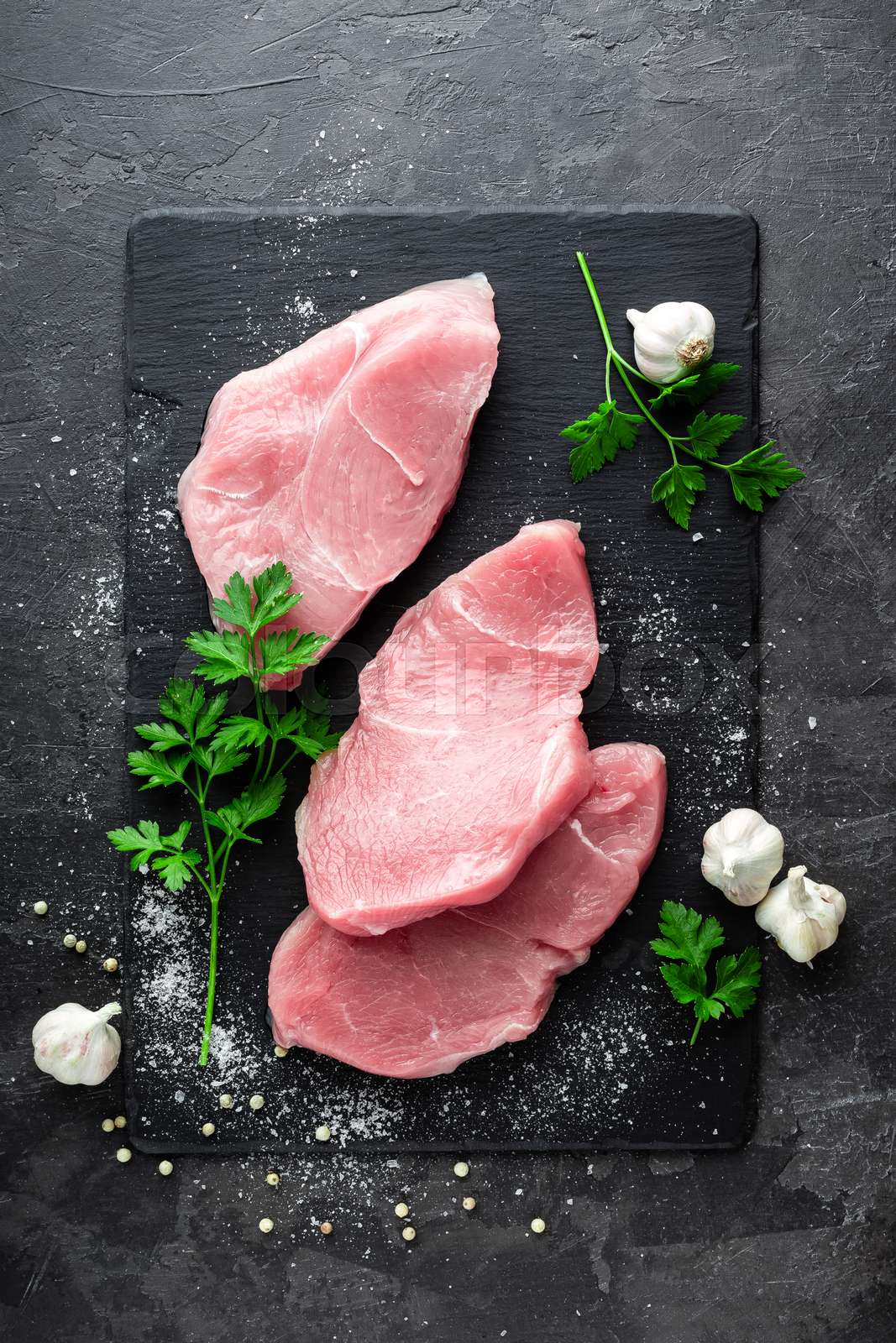 Raw turkey meat. Fresh turkey meat steakes sliced | Stock image | Colourbox